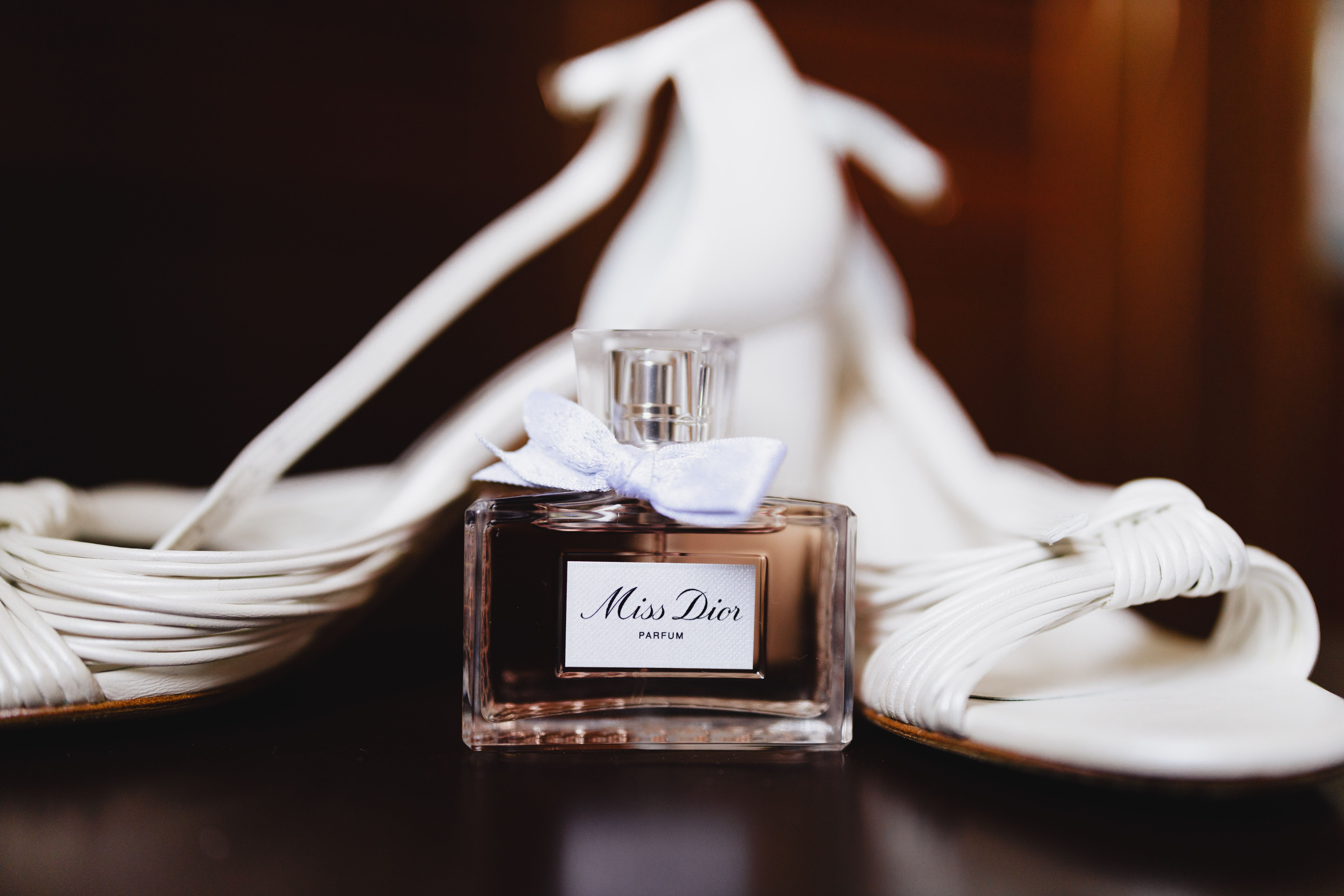 Elegant Miss Dior Perfume with White Sandals · Free Stock Photo