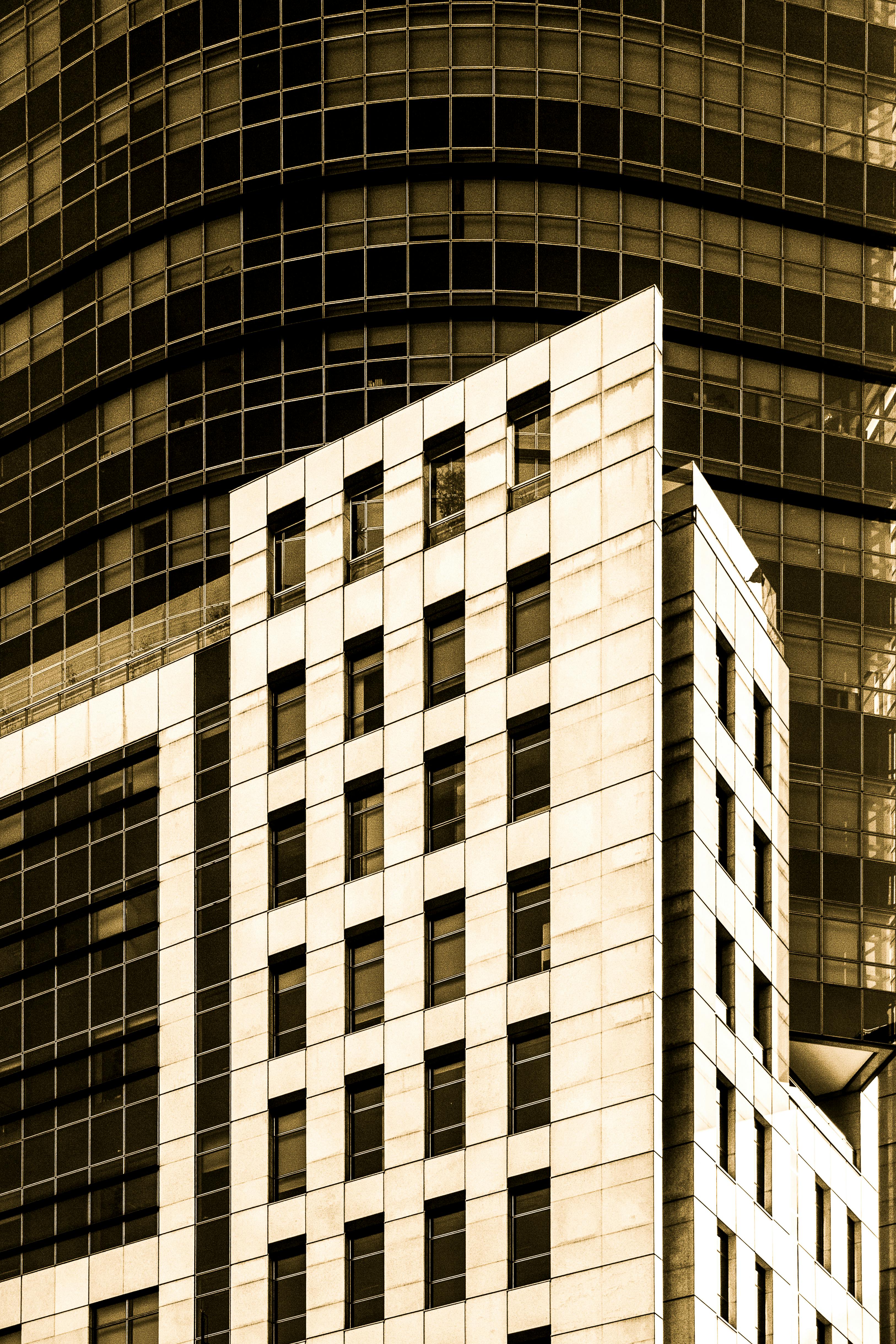 Modern Architectural Facade with Geometric Patterns · Free Stock Photo