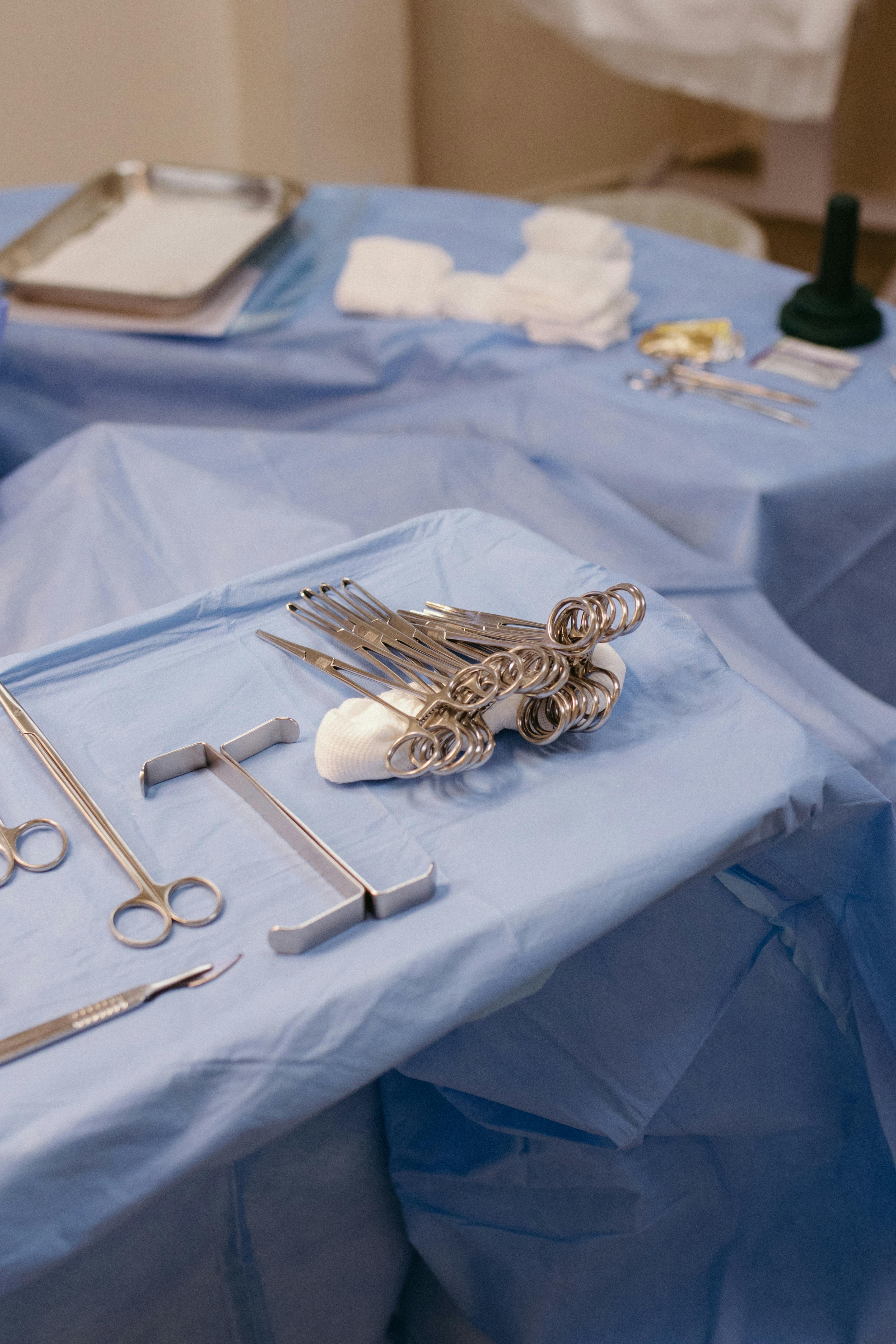 Surgical Instruments on Sterile Blue Drape · Free Stock Photo