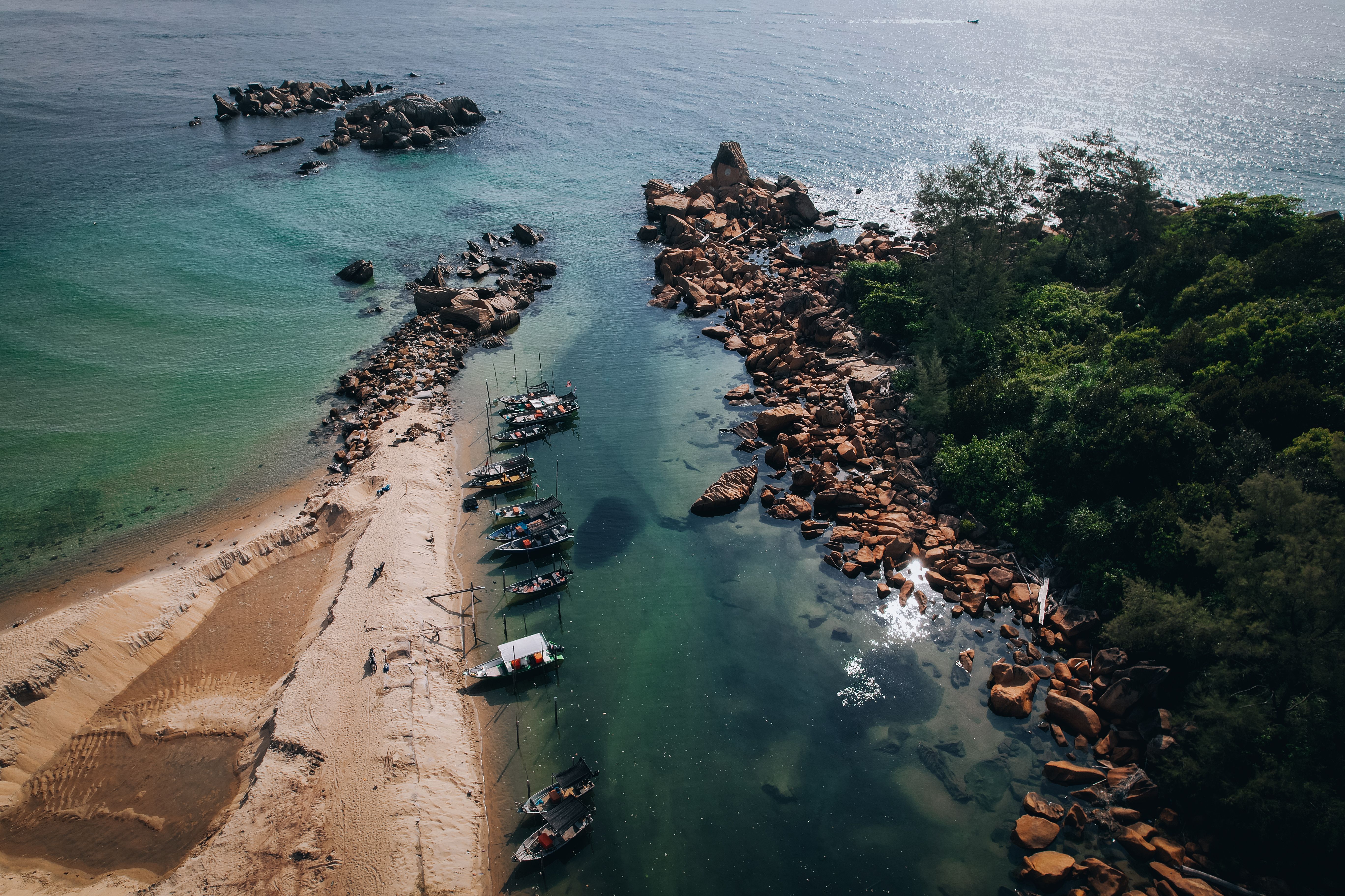 Aerial View of Scenic Coastal Landscape with Boats · Free Stock Photo