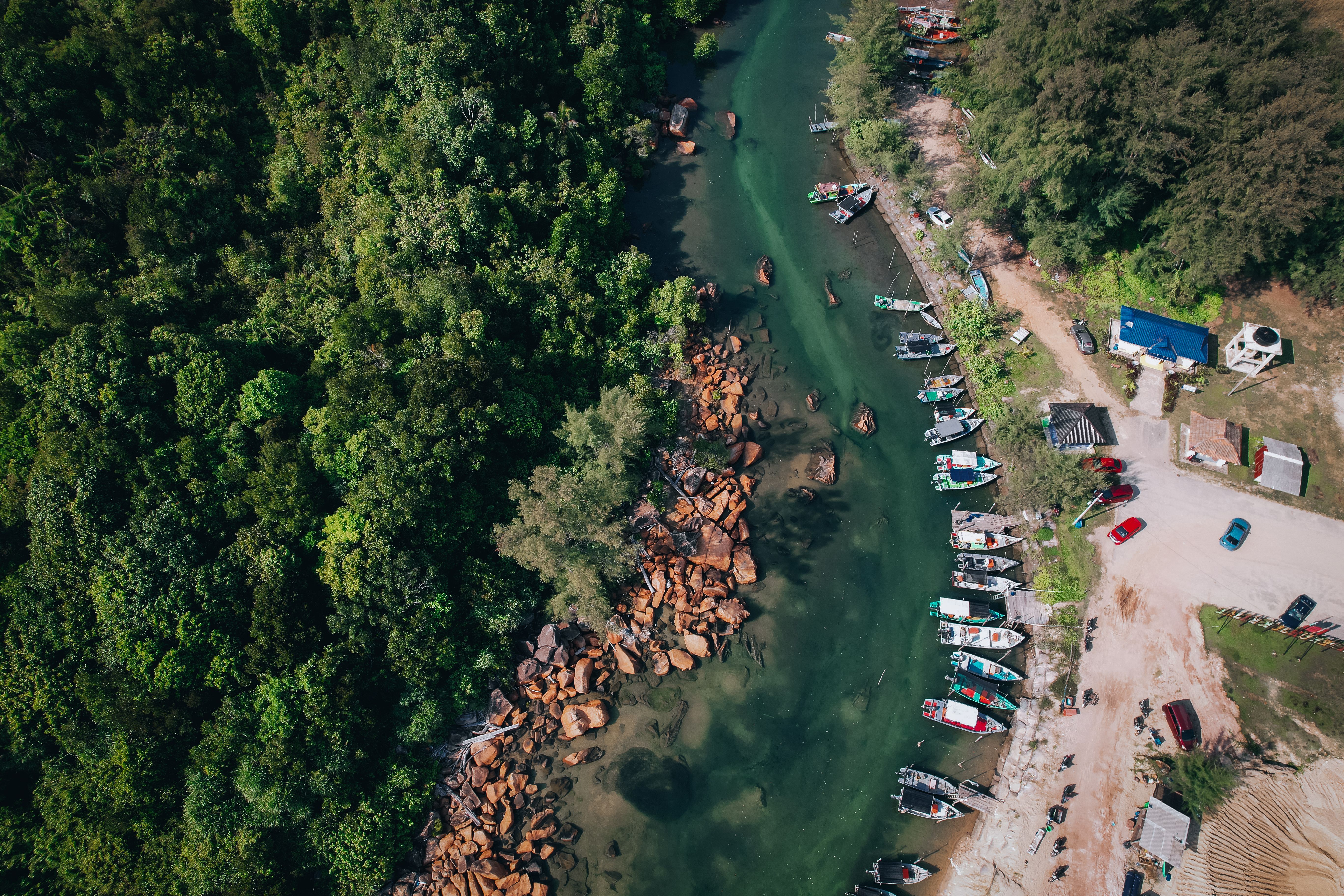 Aerial View of Boats on Tropical Riverbank · Free Stock Photo