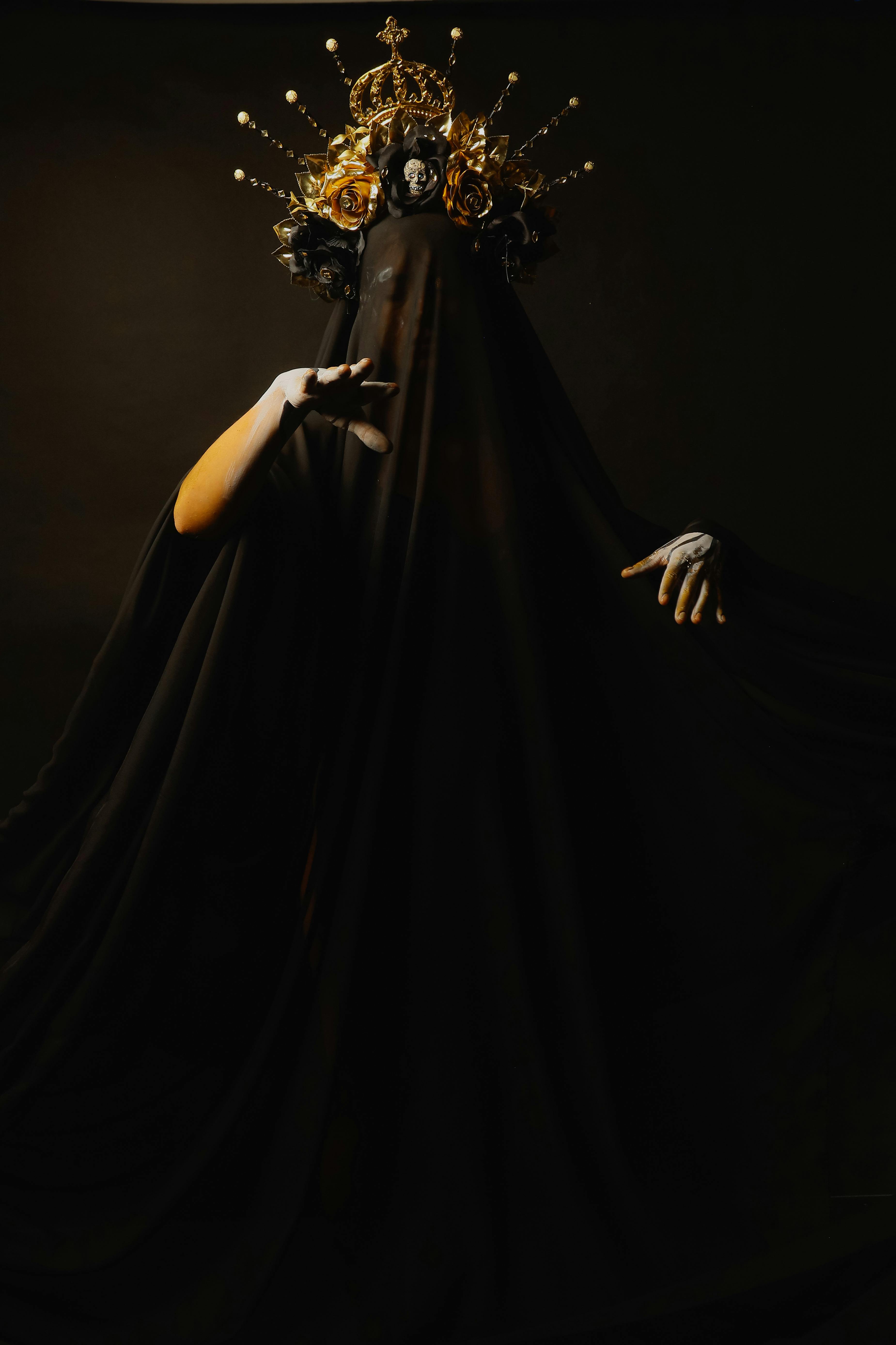 Artistic Portrait of Veiled Figure in Dark Attire · Free Stock Photo