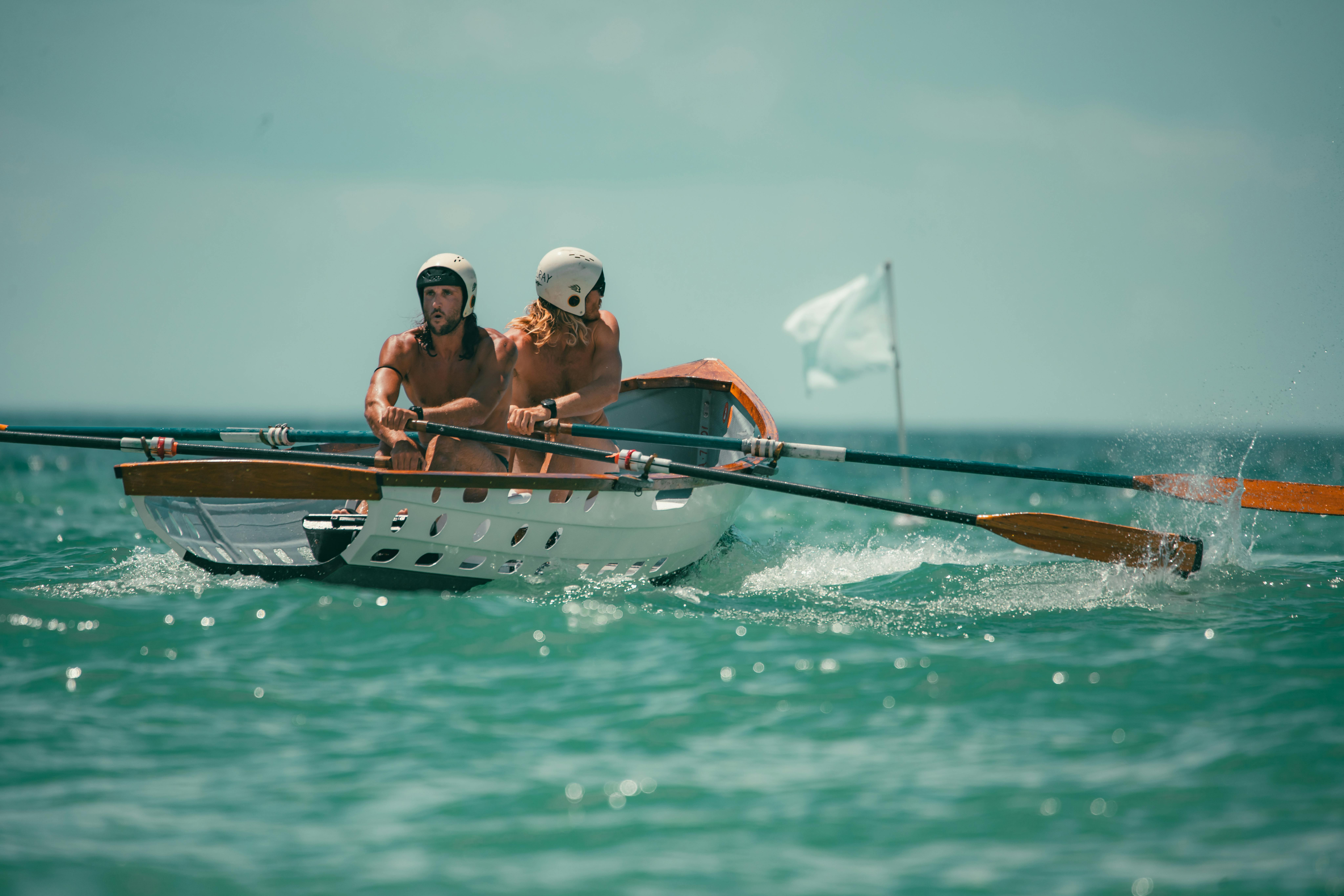 Dynamic Lifeguard Rowing Competition at Sea · Free Stock Photo