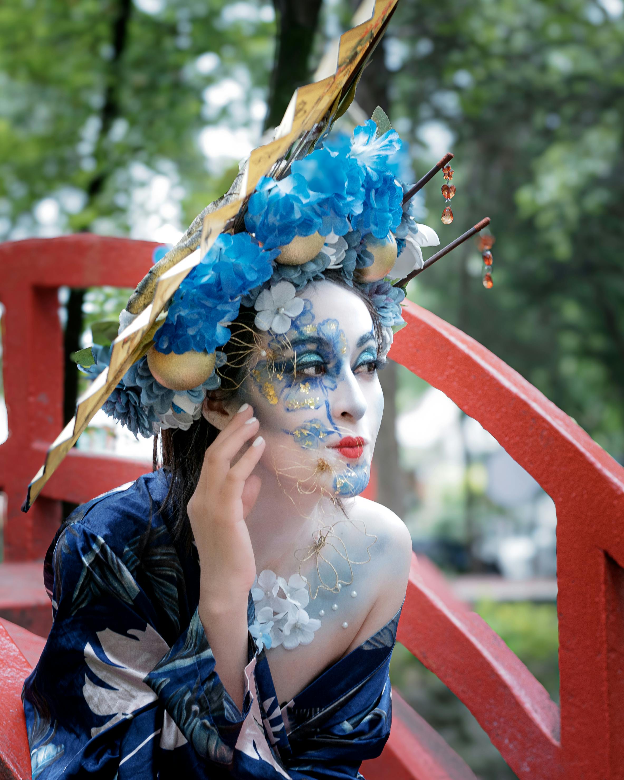 Modern Geisha in Blue Kimono on Red Bridge · Free Stock Photo