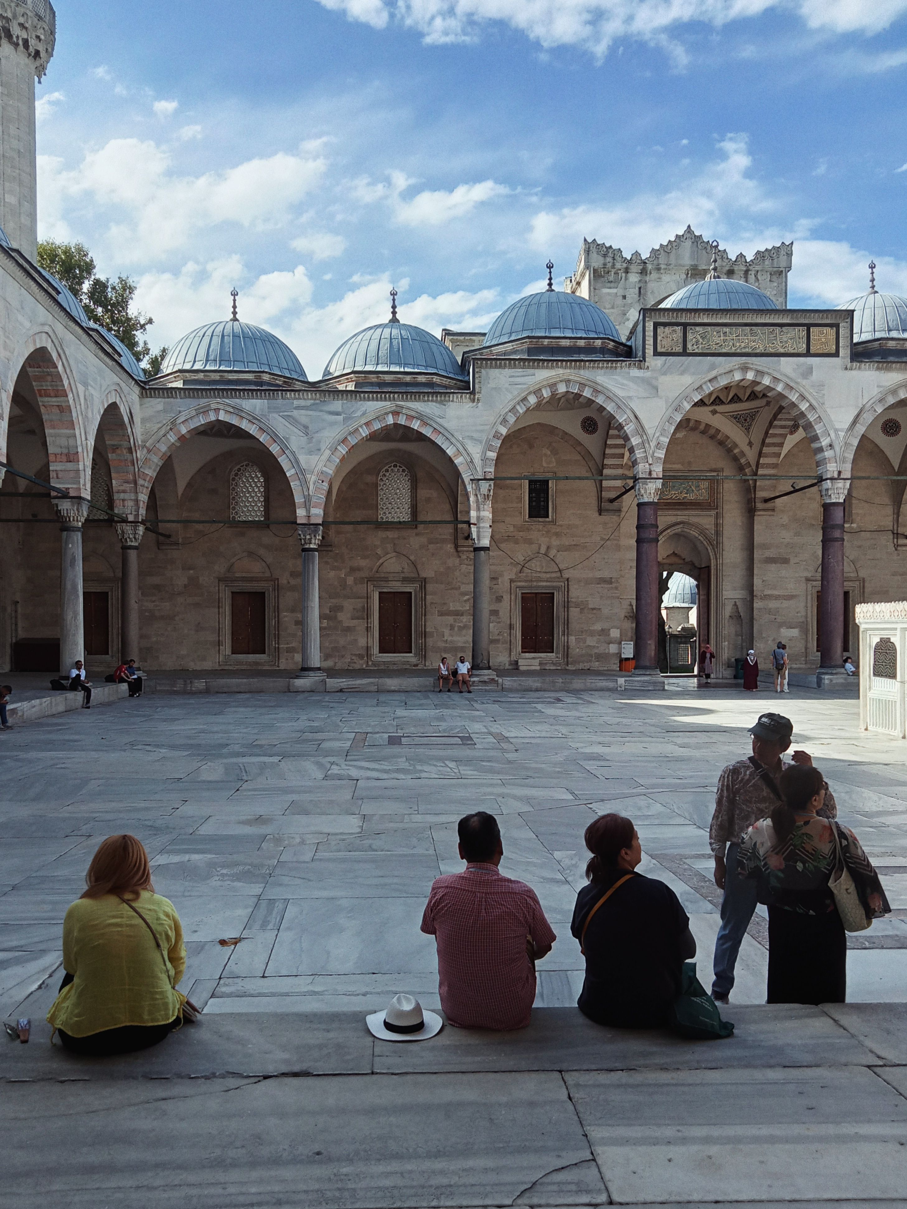 Visitors at Courtyard of Blue Mosque in Istanbul · Free Stock Photo