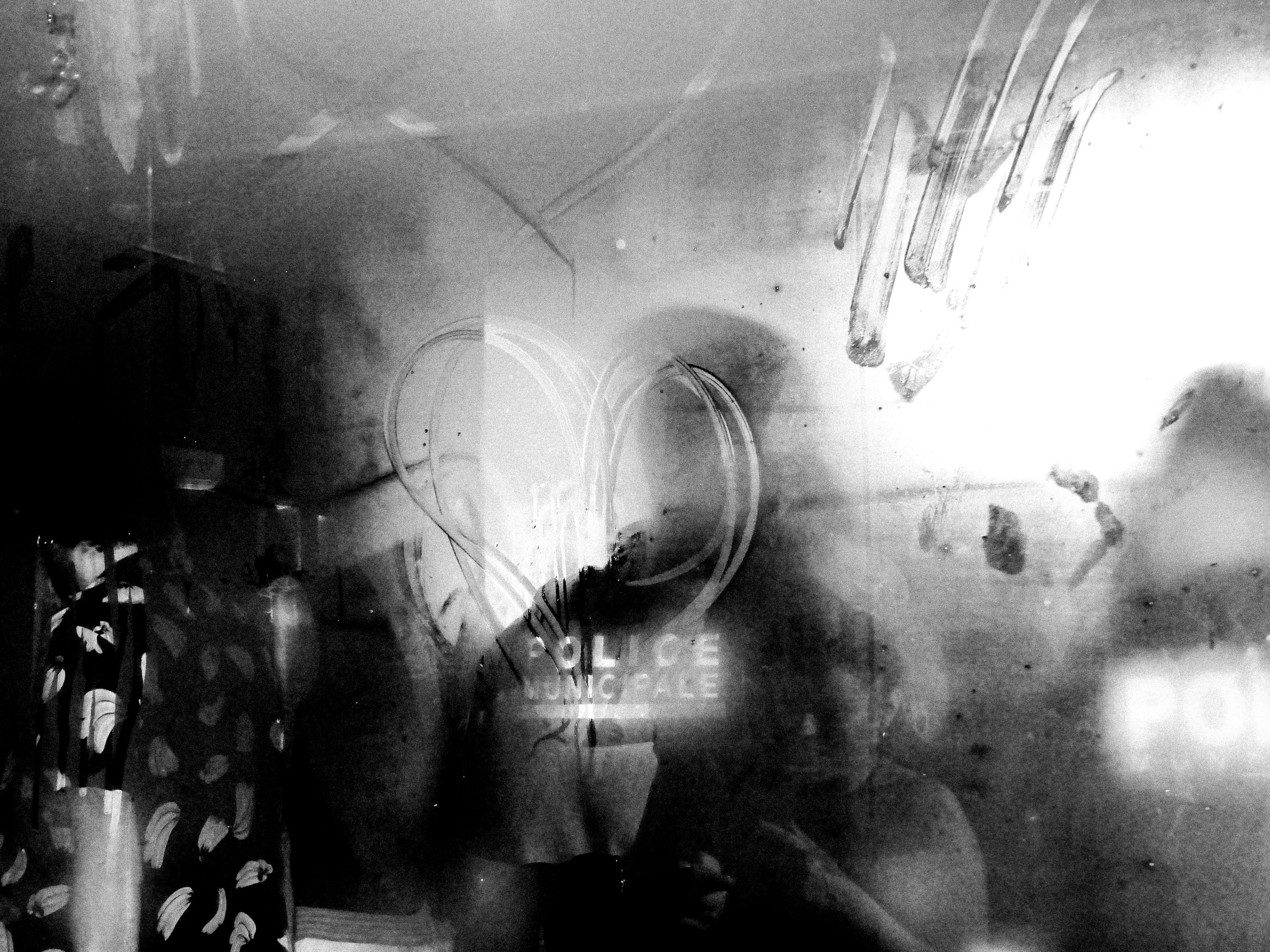 Artistic Black and White Police Reflection in Arles · Free Stock Photo