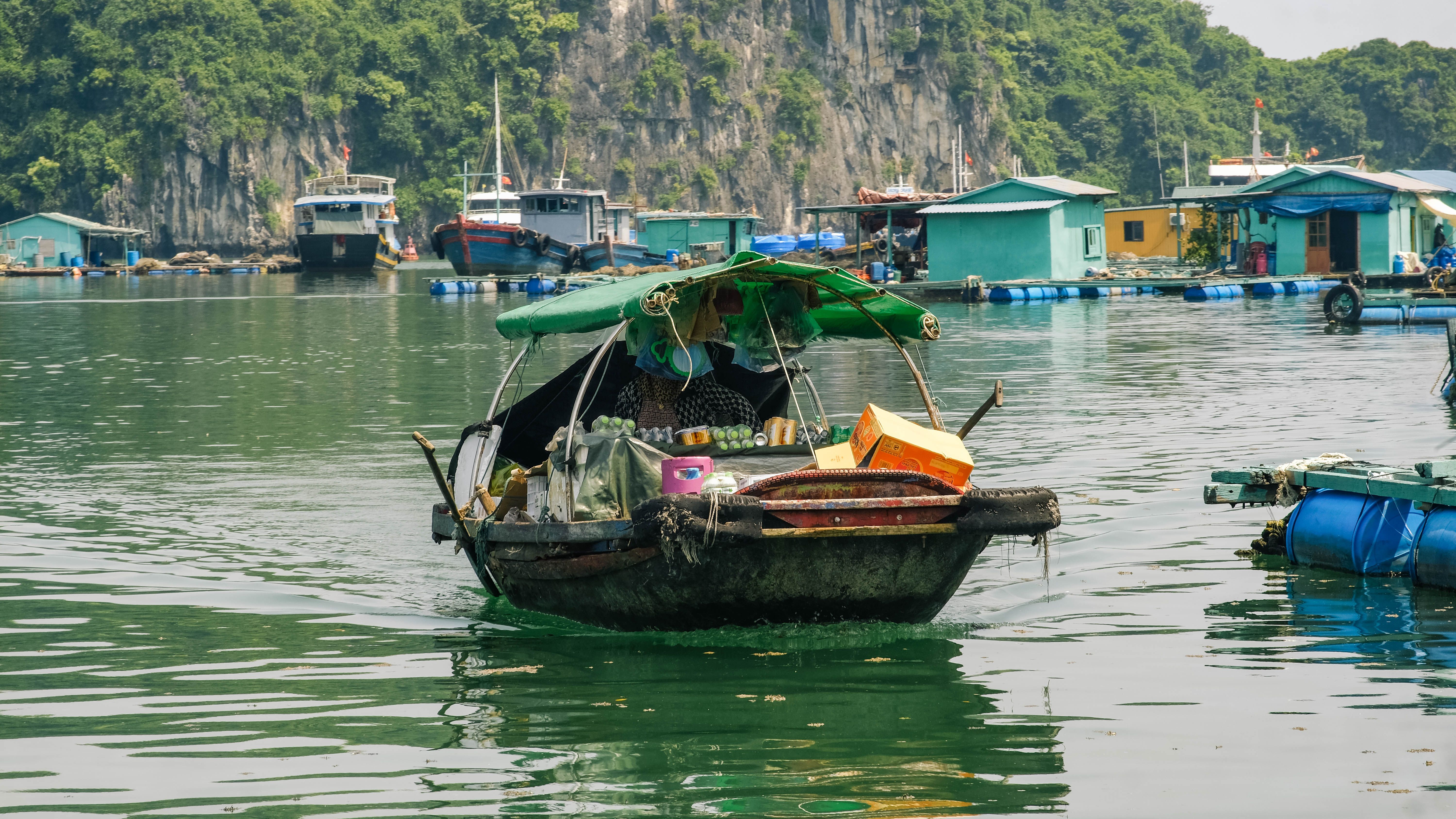 Traditional Boat Vendor in Ha Long Bay, Vietnam · Free Stock Photo