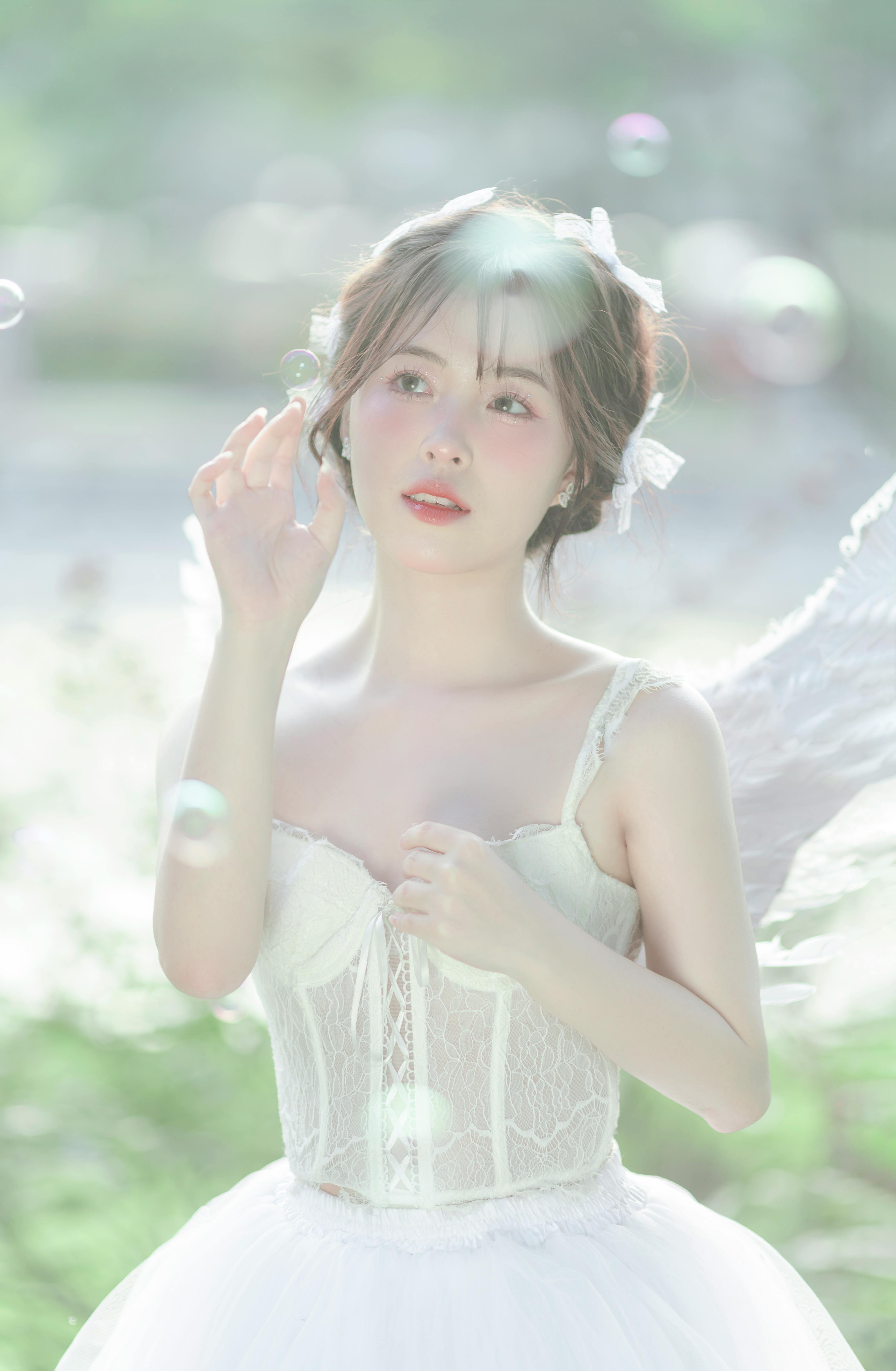 Ethereal Angelic Portrait in Hanoi Garden · Free Stock Photo