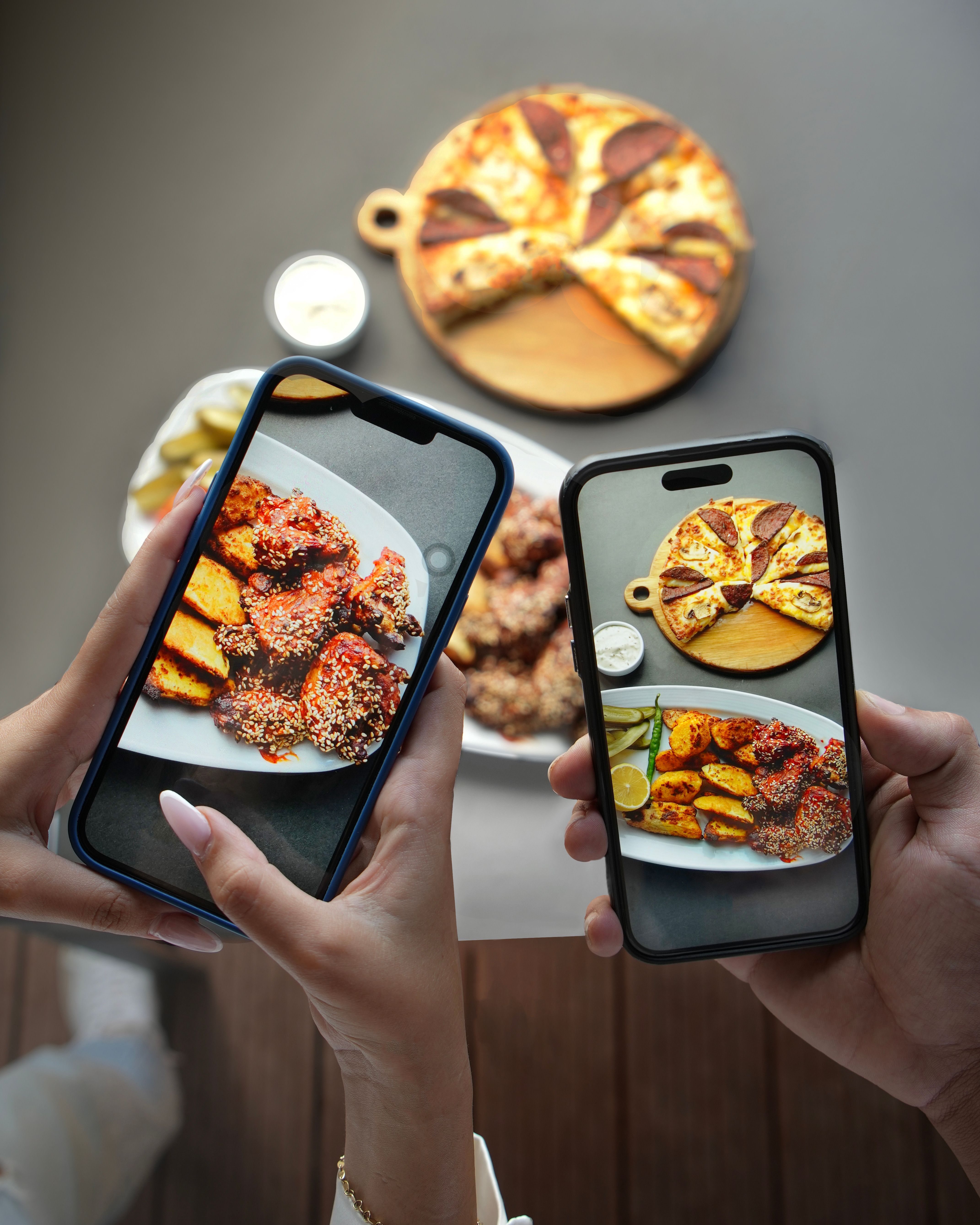 Hands Taking Food Photos with Smartphones · Free Stock Photo