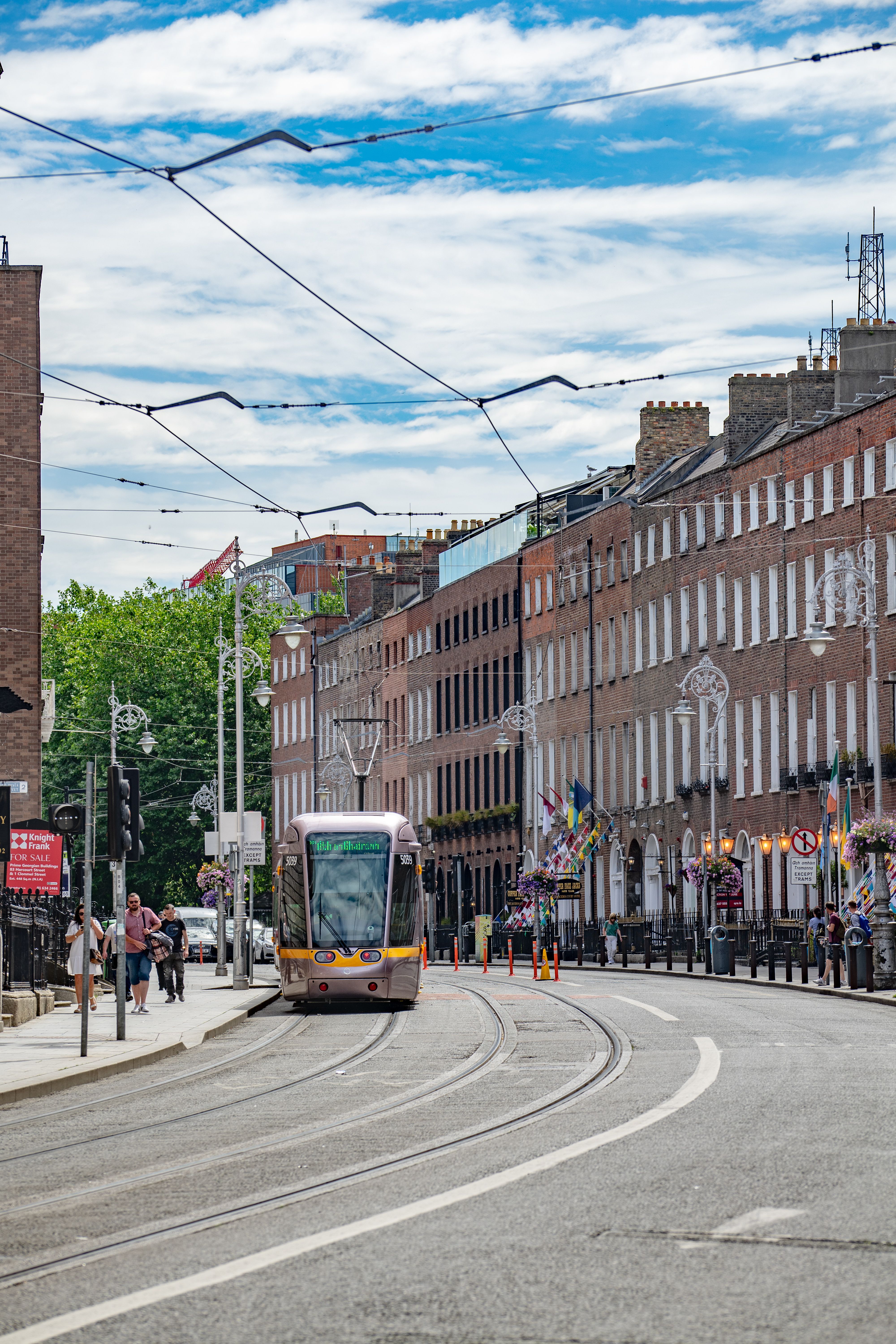 Urban Scene with Luas Tram in Dublin Cityscape · Free Stock Photo