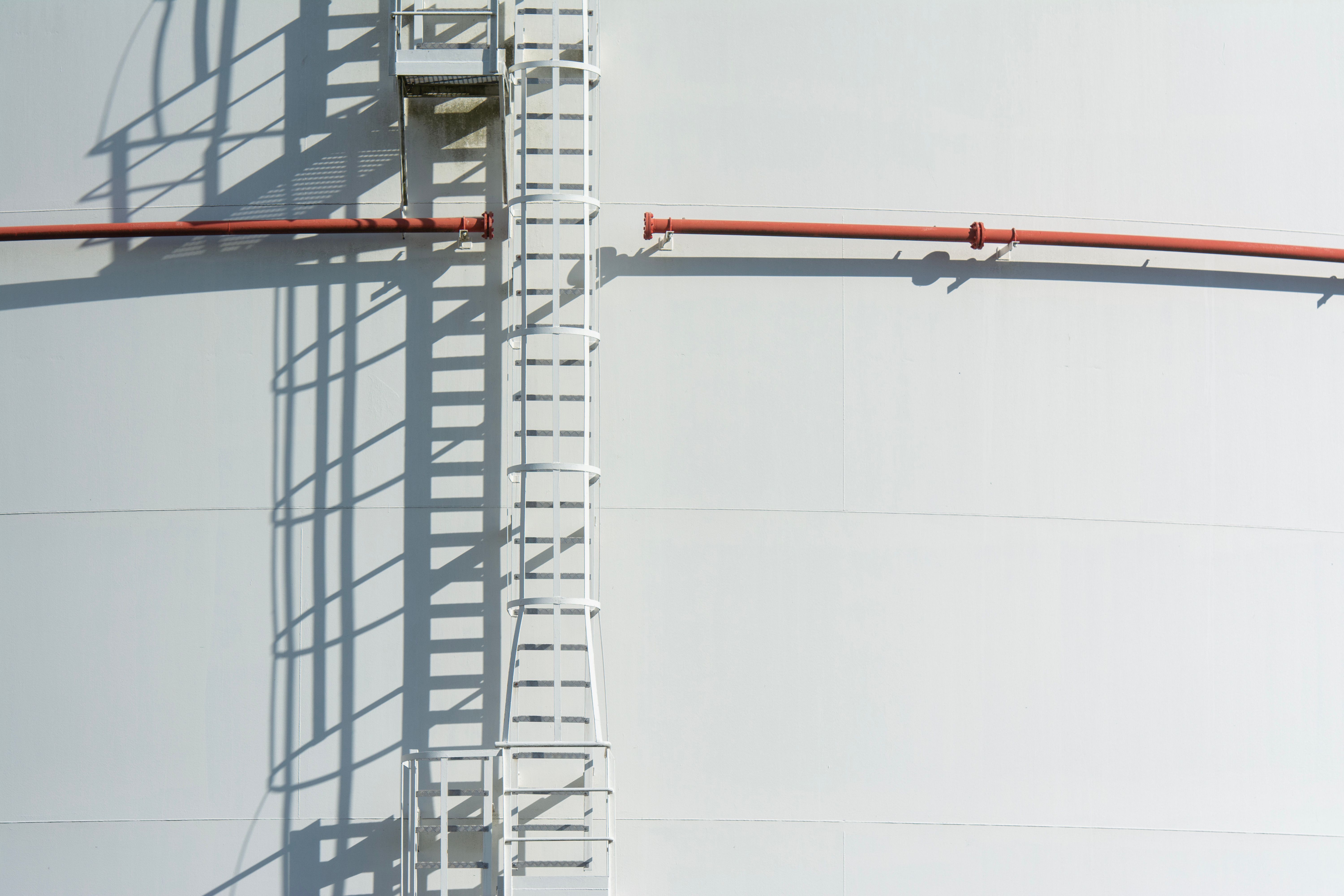 Industrial Metal Ladder on Storage Tank · Free Stock Photo