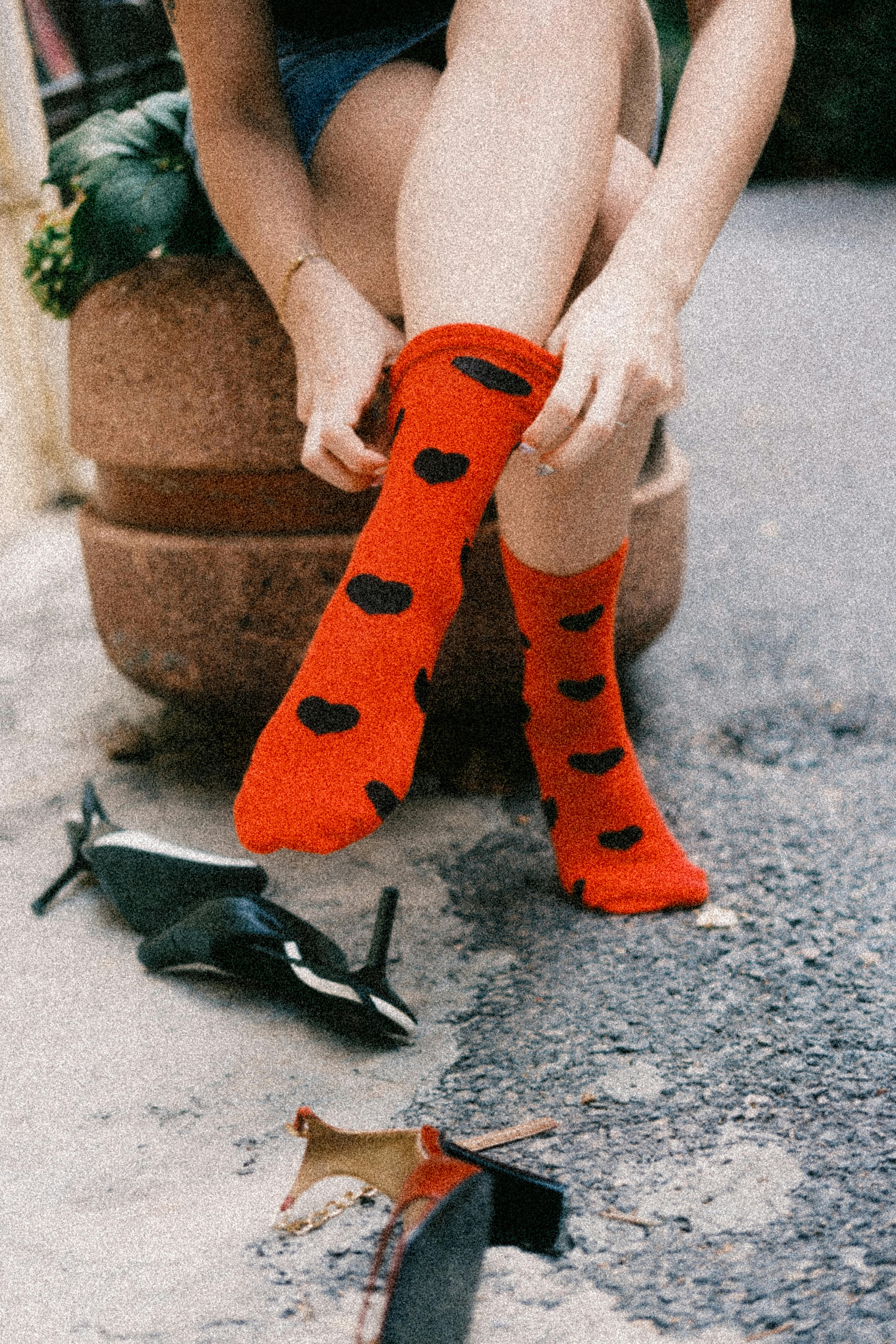 Woman Wearing Red Polka Dot Socks Outdoors · Free Stock Photo