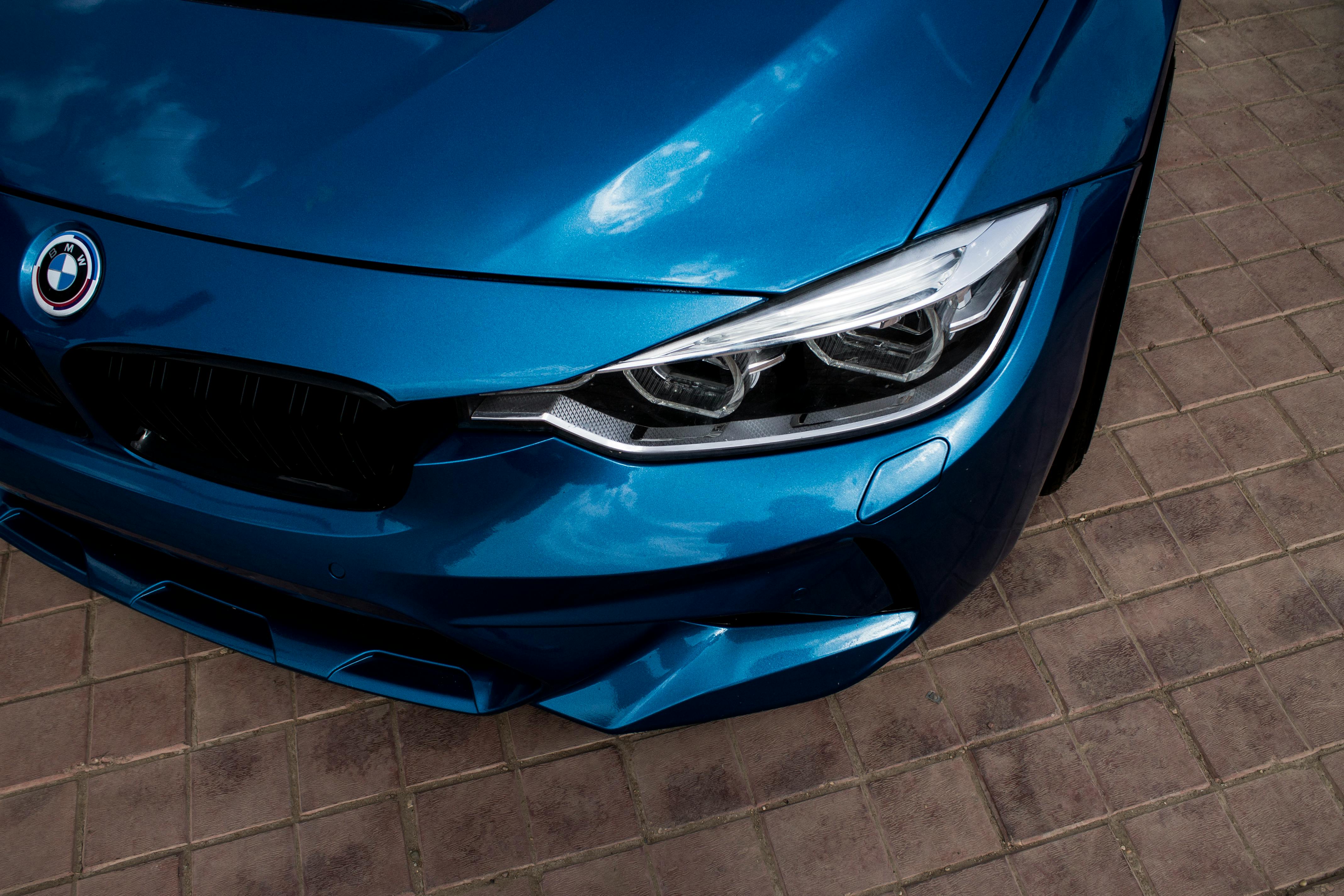 Close-up of Blue Luxury Car Front End · Free Stock Photo