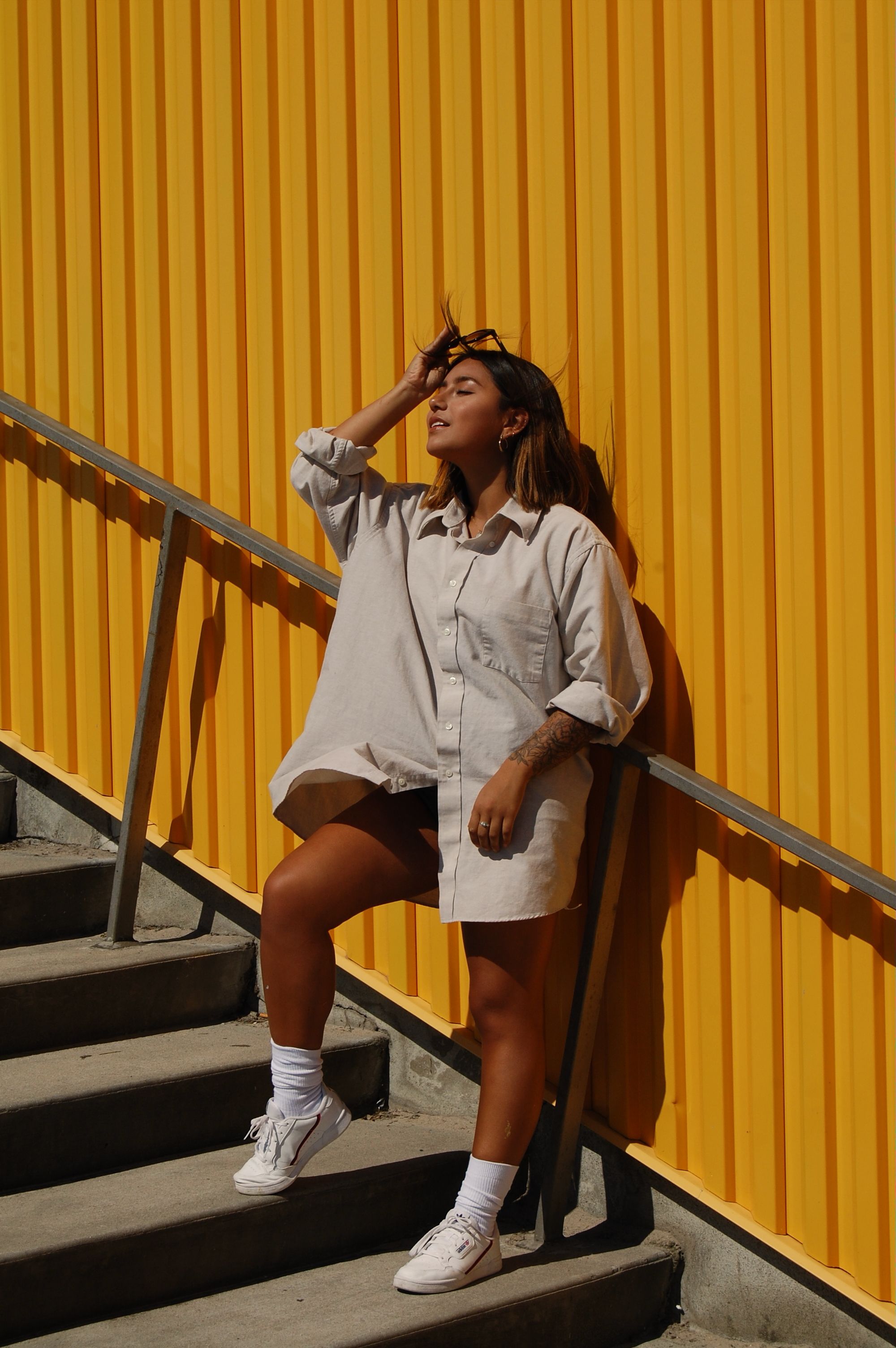 Woman Standing on the Stair Posing · Free Stock Photo