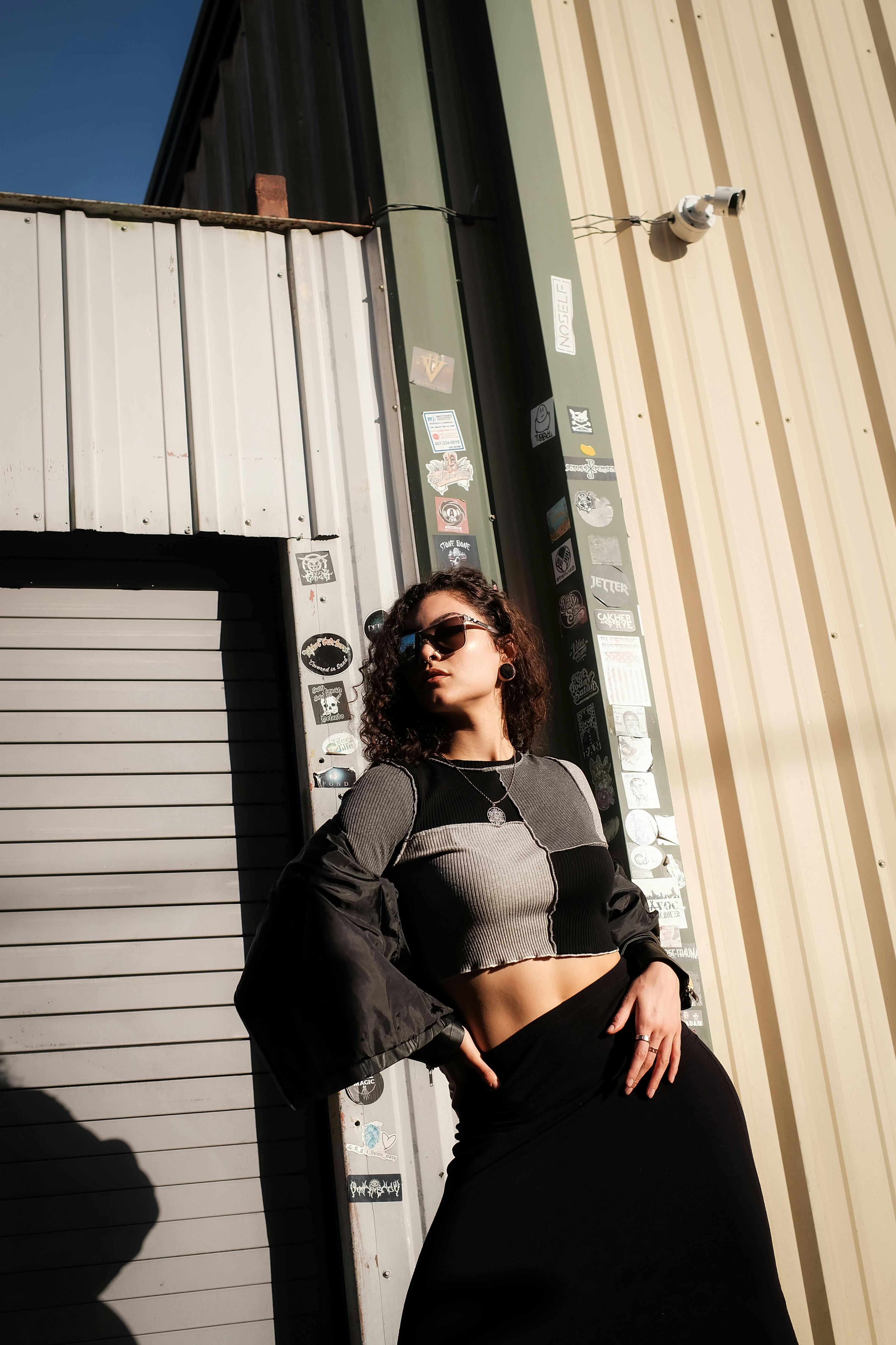 Urban Fashion Model in Industrial Setting · Free Stock Photo