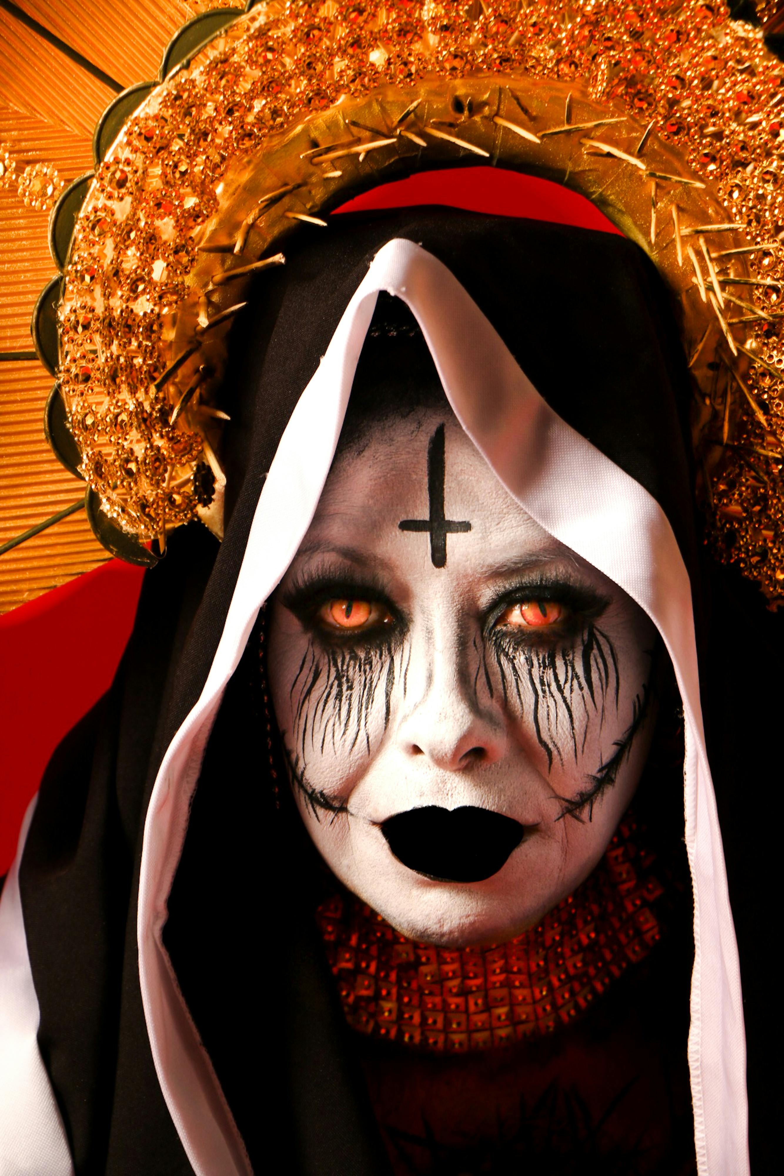 Dramatic Gothic Nun Portrait with Bold Makeup · Free Stock Photo