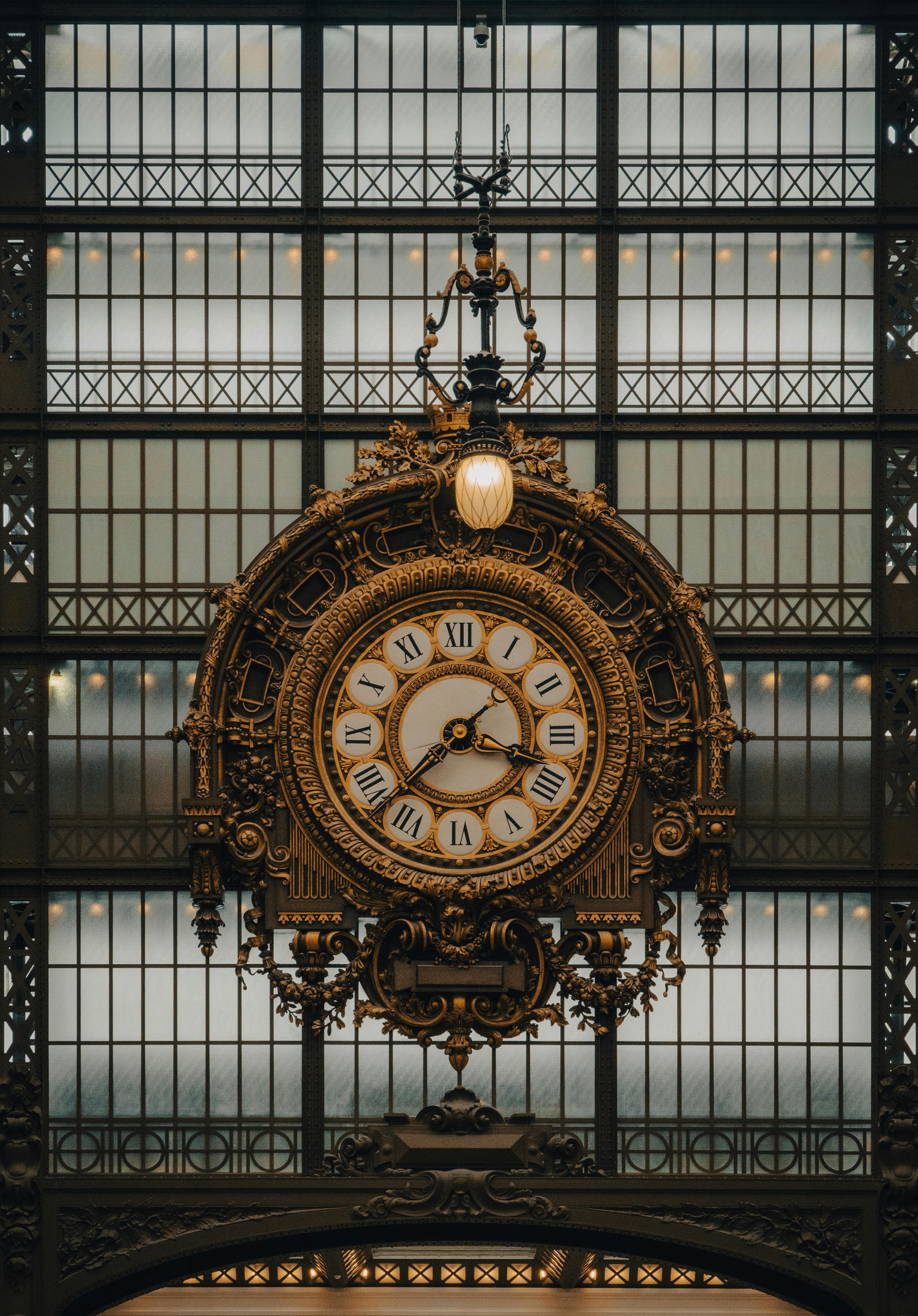 Ornate Antique Clock in Architectural Setting · Free Stock Photo