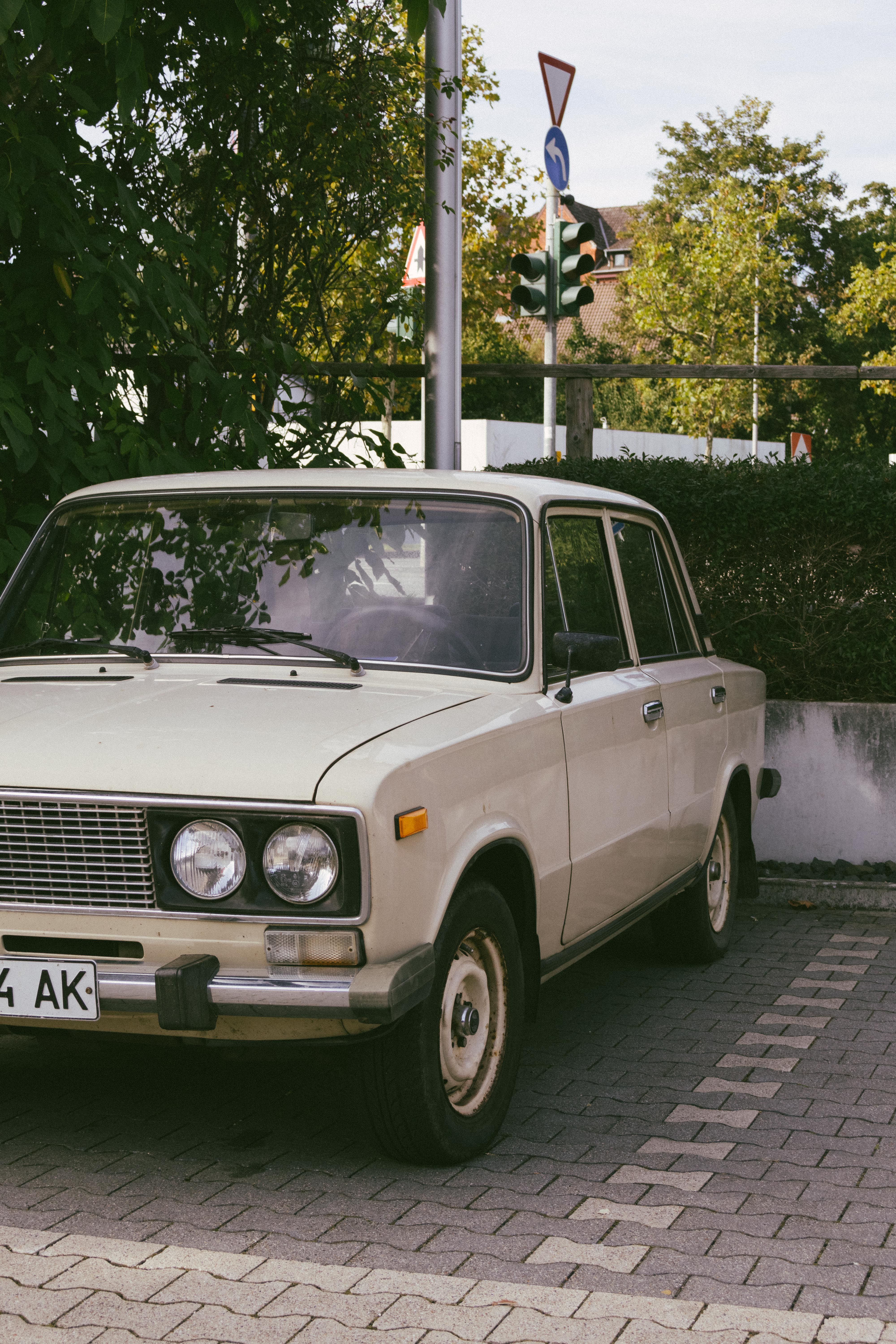 Classic Lada Car in Urban Parking Area · Free Stock Photo