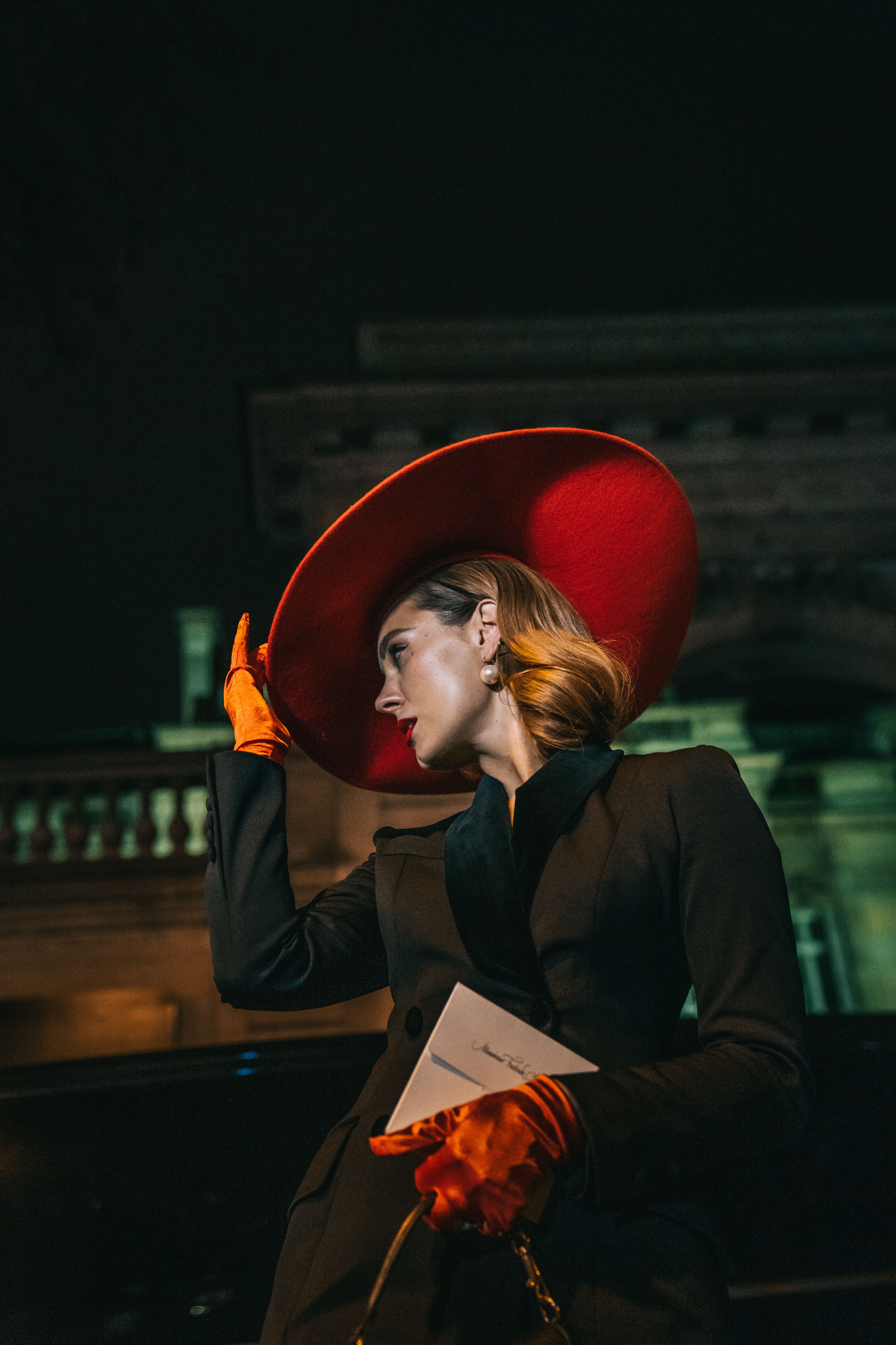 Elegant Woman in Red Hat at Night in Paris · Free Stock Photo