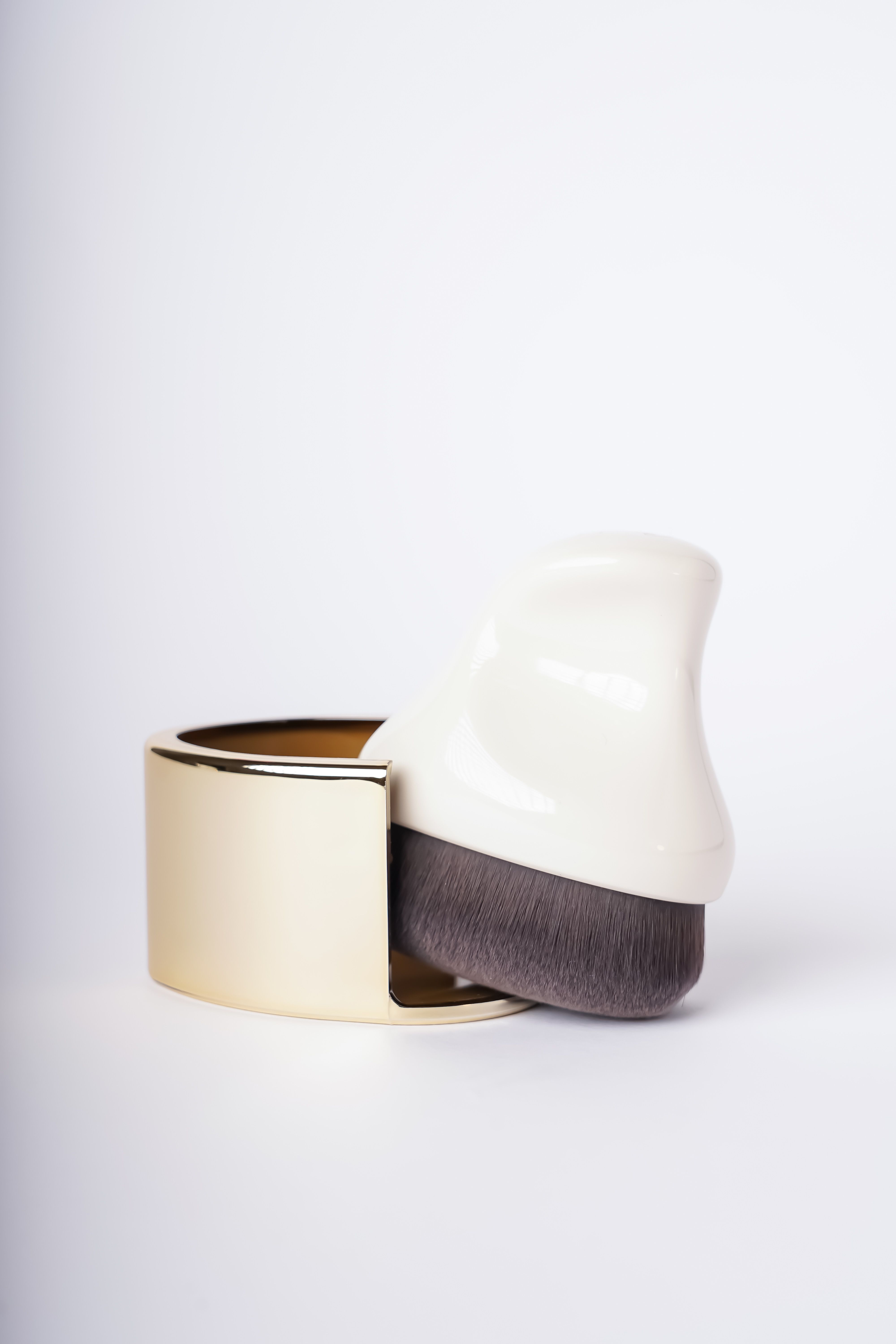 Elegant Cosmetic Brush with Luxury Stand · Free Stock Photo