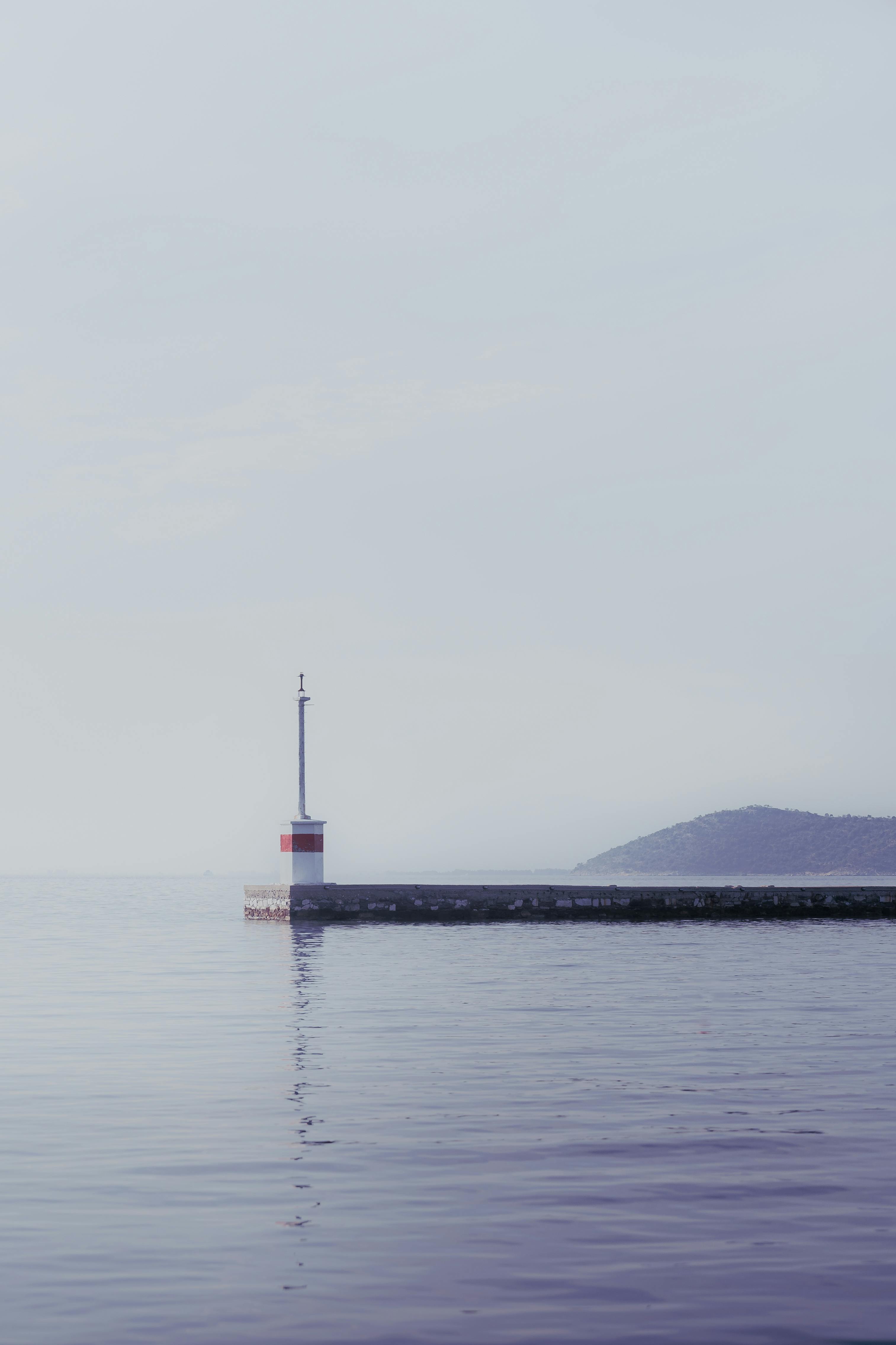 Minimalist Morning Lighthouse by the Sea · Free Stock Photo