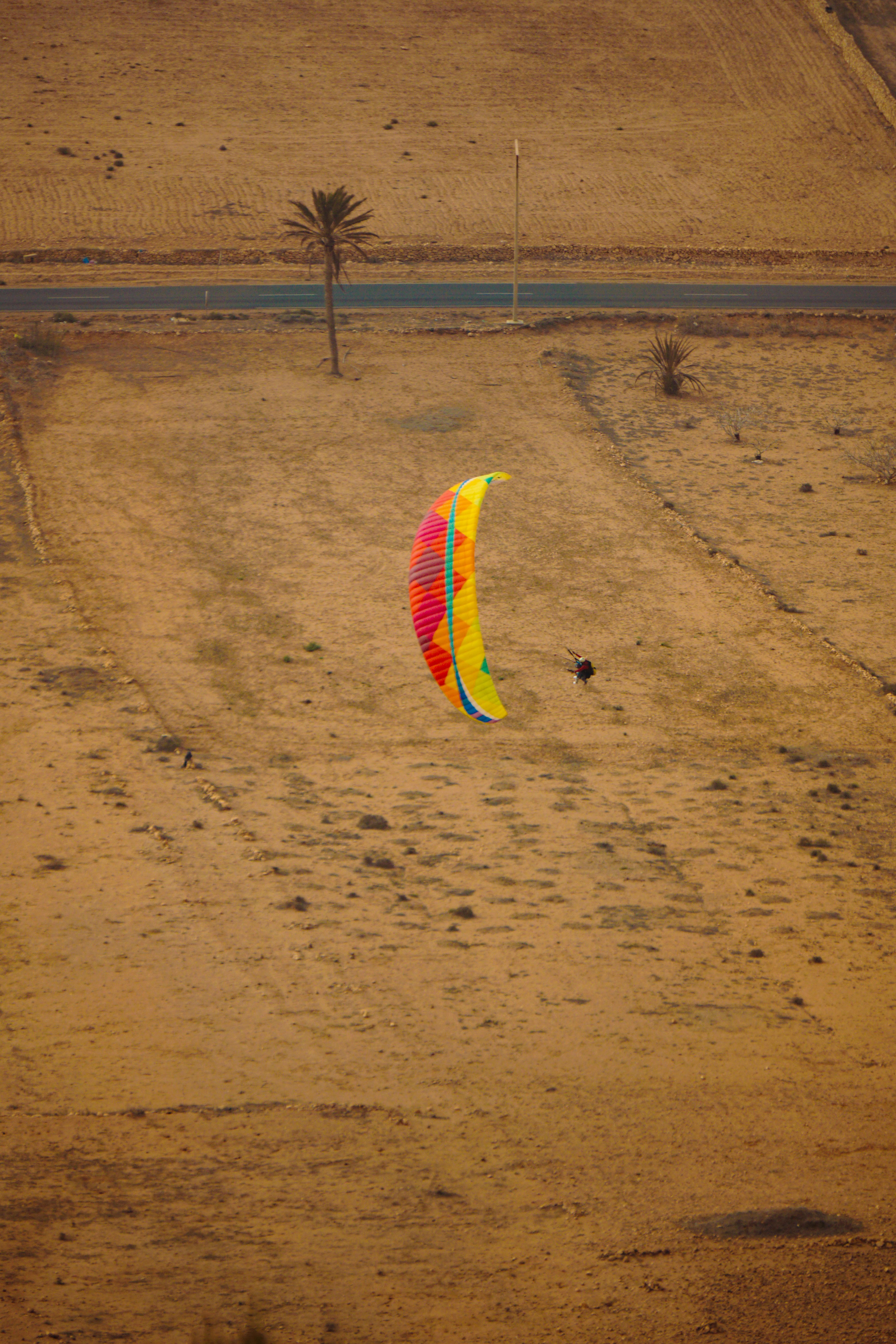 Person on Parachute during Daytime · Free Stock Photo