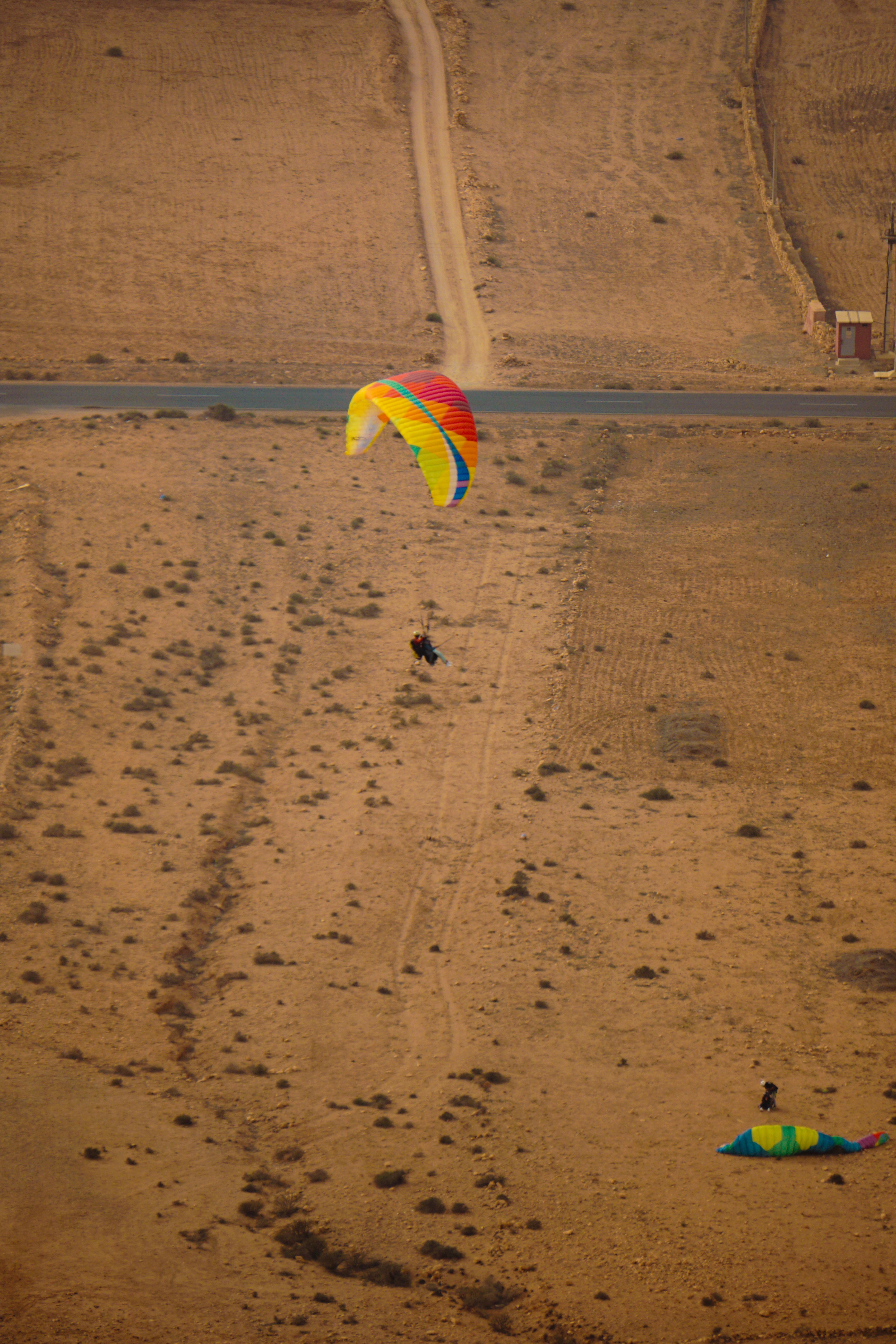 Aerial View of Paragliding Adventure · Free Stock Photo