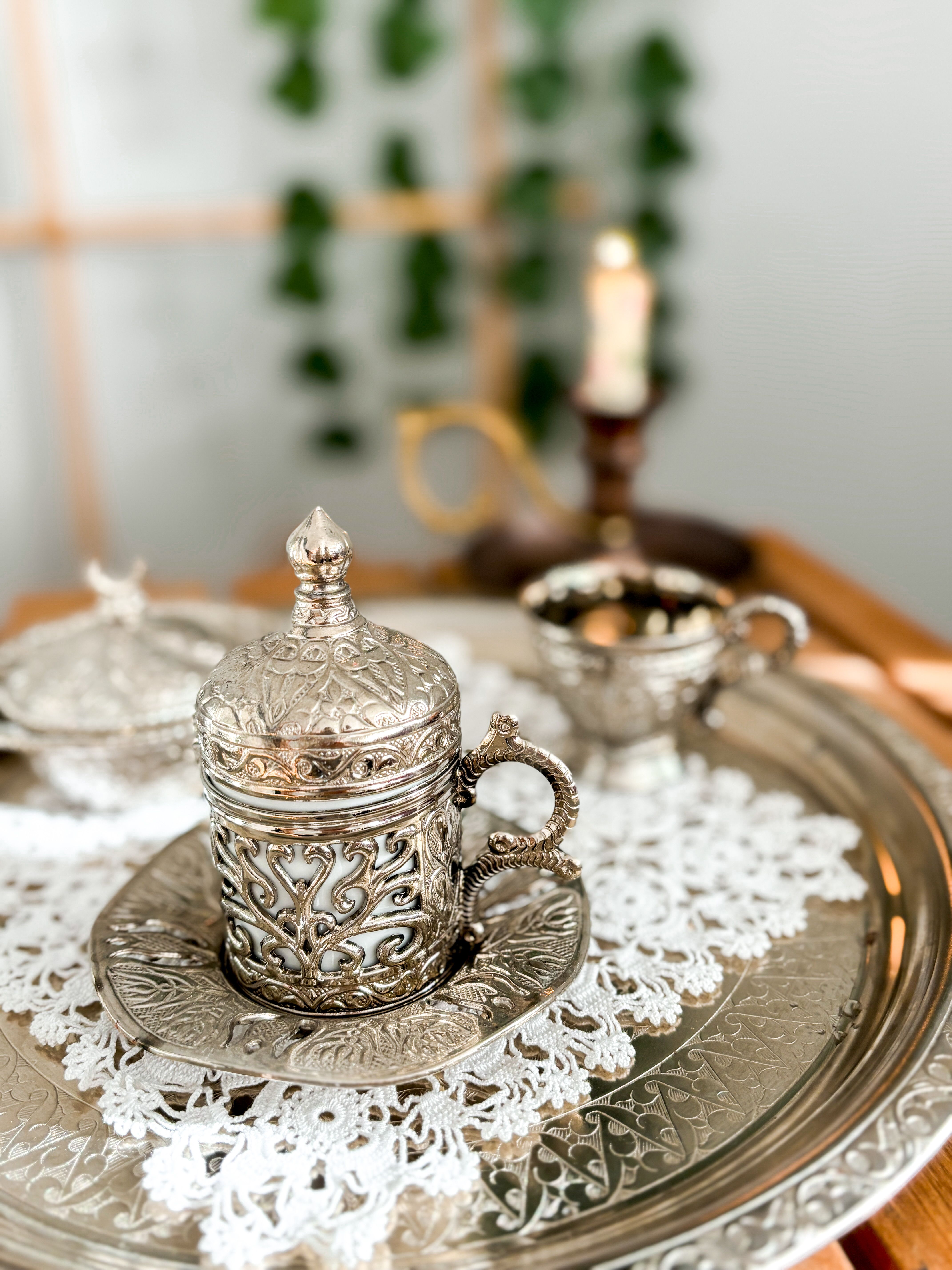Elegant Silver Tea Set on Lace Doily · Free Stock Photo