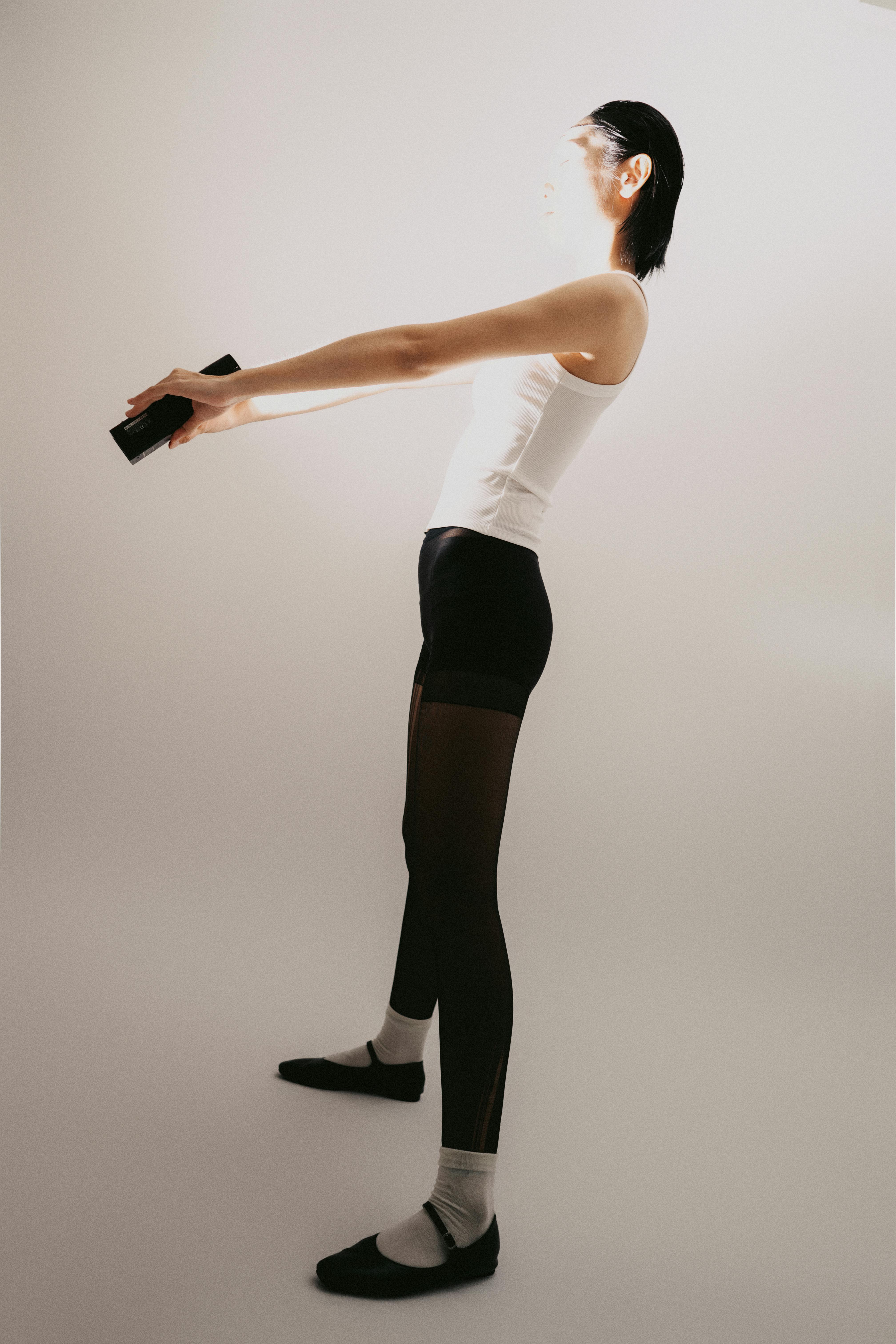 Minimalist Fitness Woman Exercising Indoors · Free Stock Photo