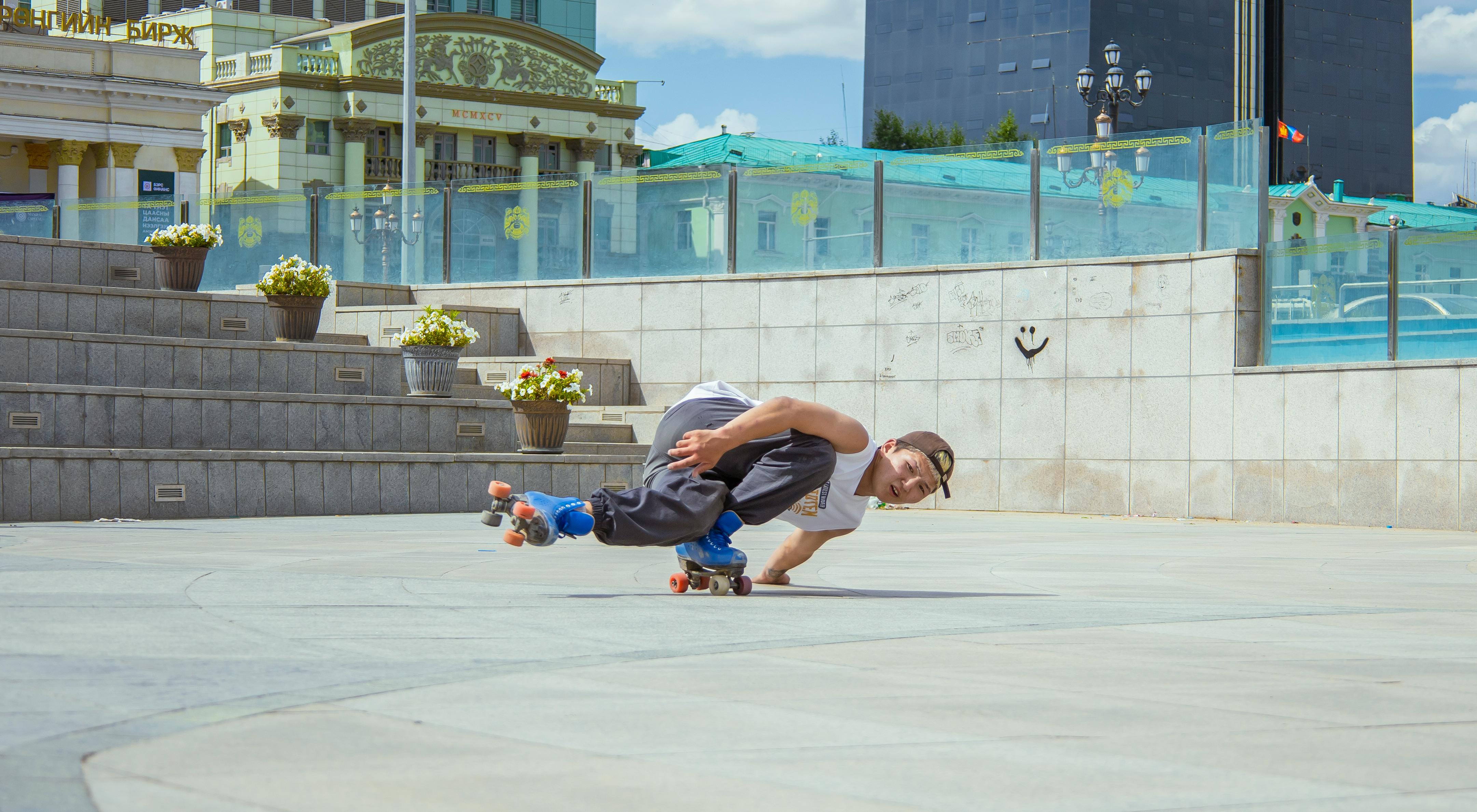 Dynamic Roller Skating Stunt in Urban Setting · Free Stock Photo
