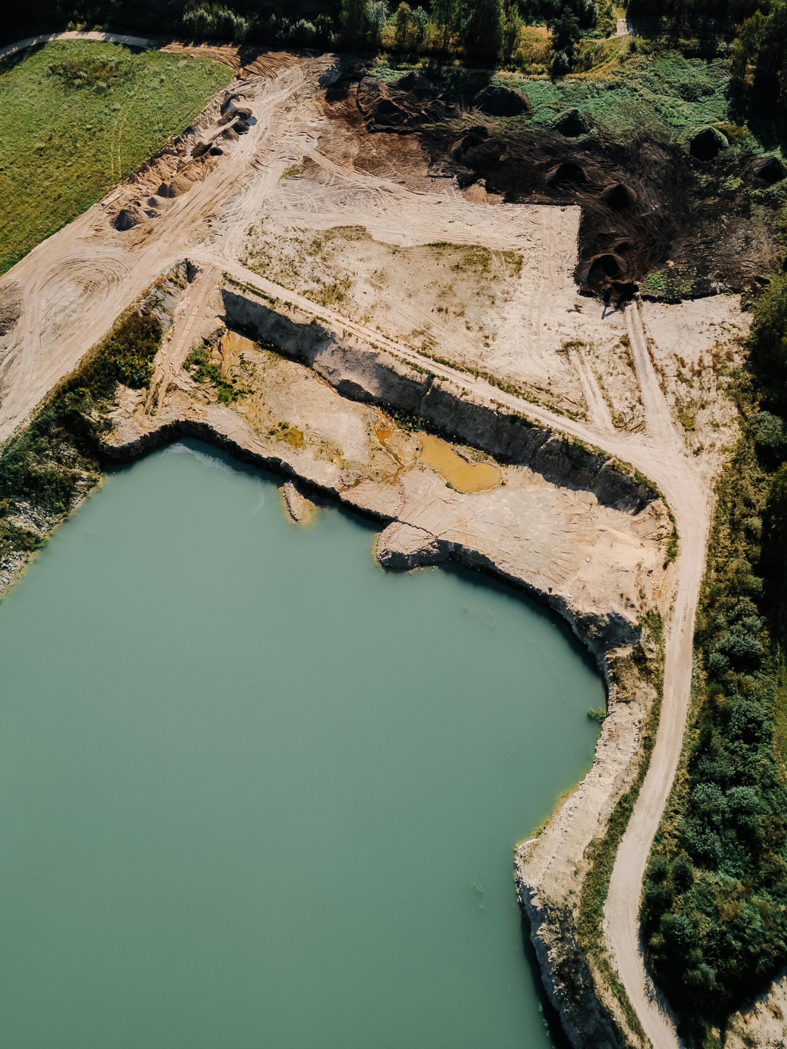 Aerial View of Quarry Near Lake in Summer · Free Stock Photo