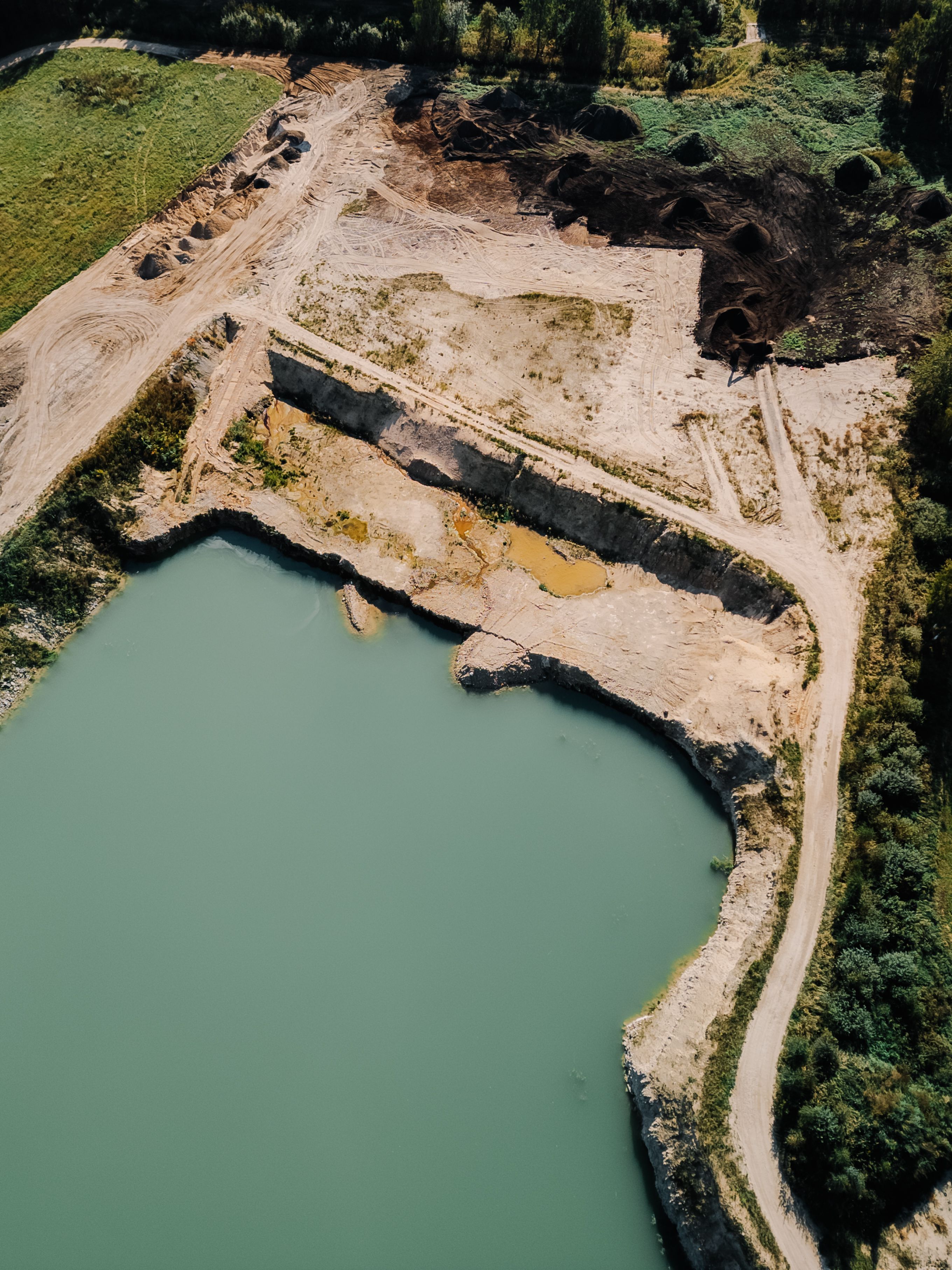 Aerial View of Quarry Near Lake in Summer · Free Stock Photo