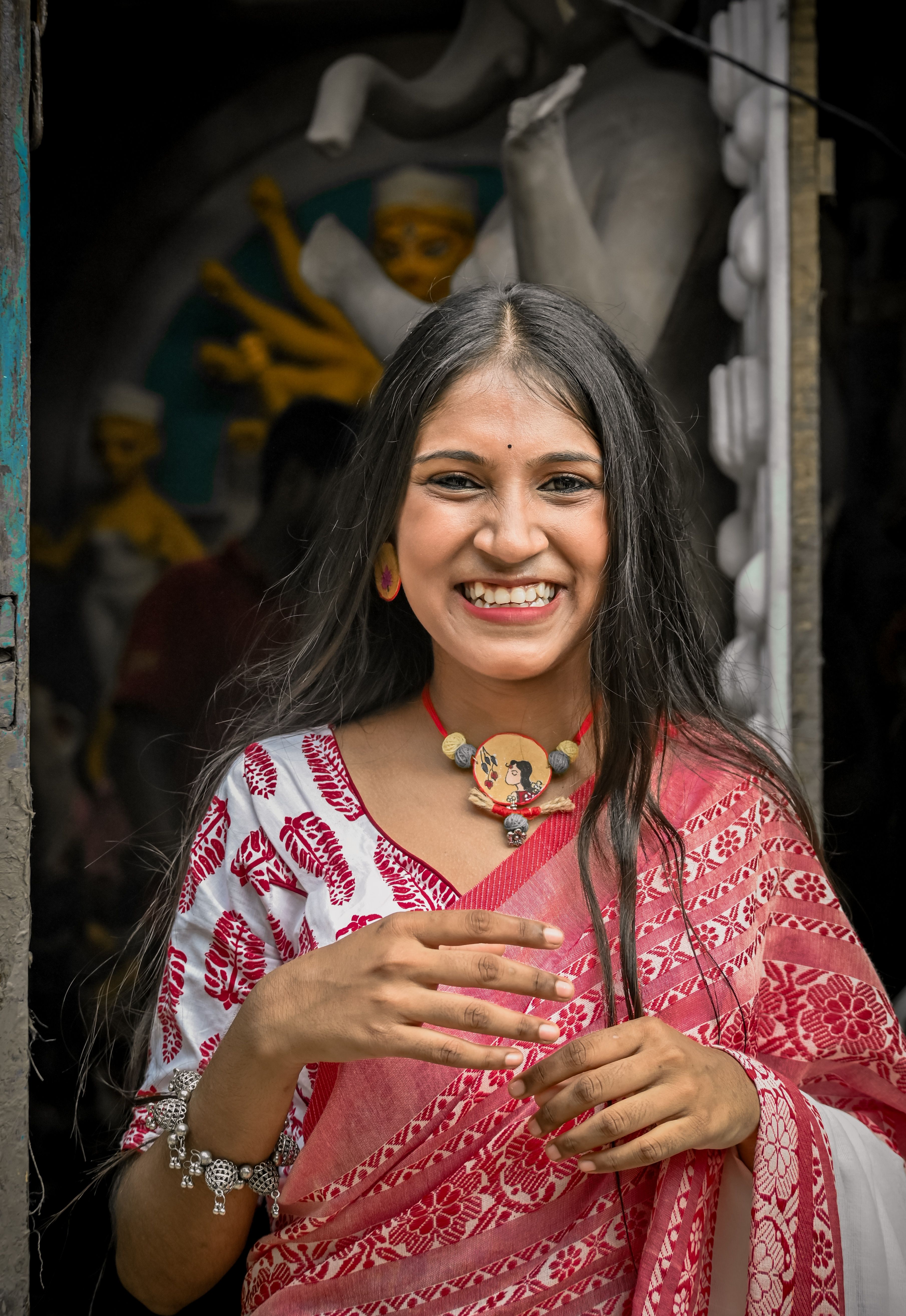 Joyful Woman in Traditional Red Saree · Free Stock Photo