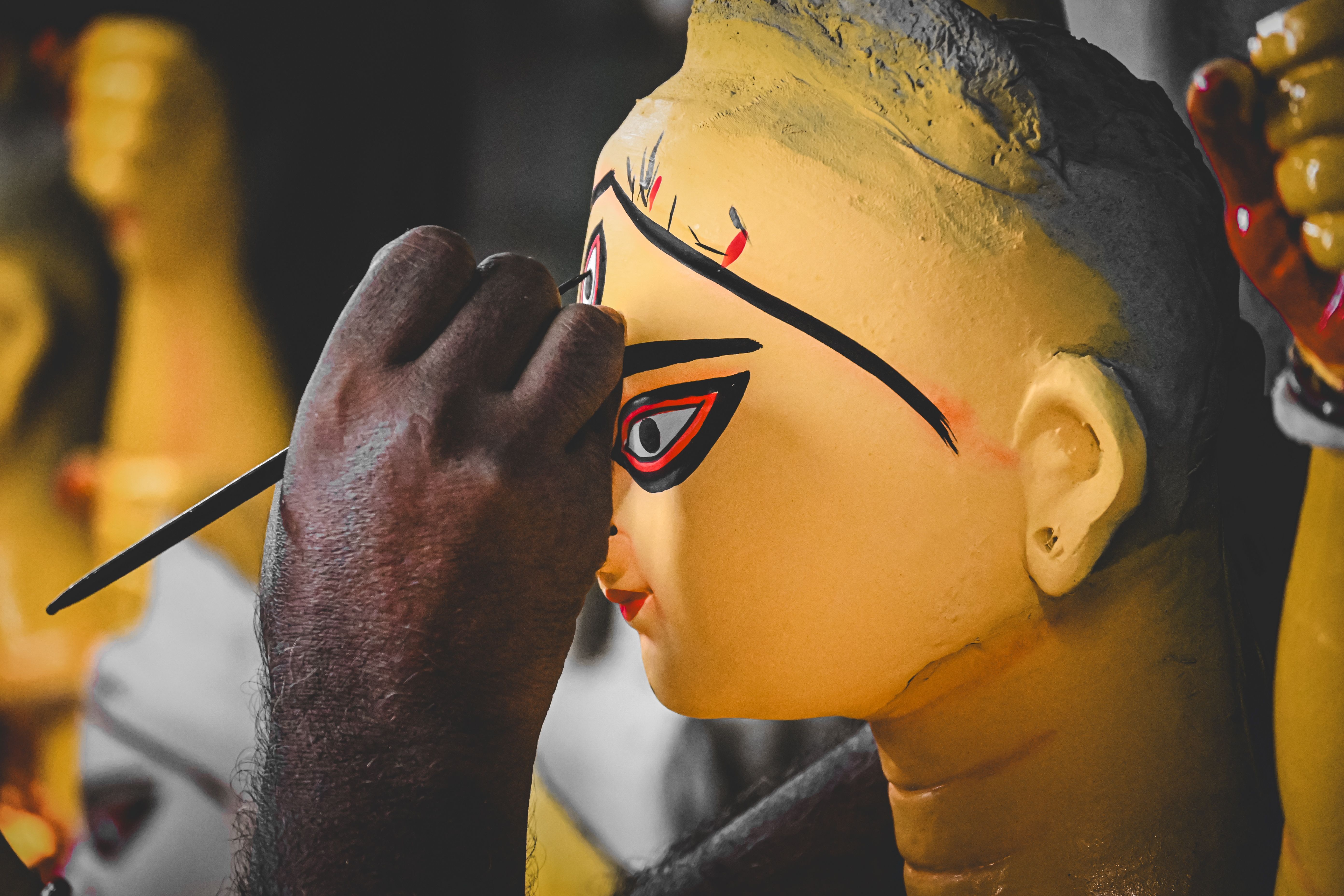 Artisan Painting Durga Idol in Kolkata Workshop · Free Stock Photo