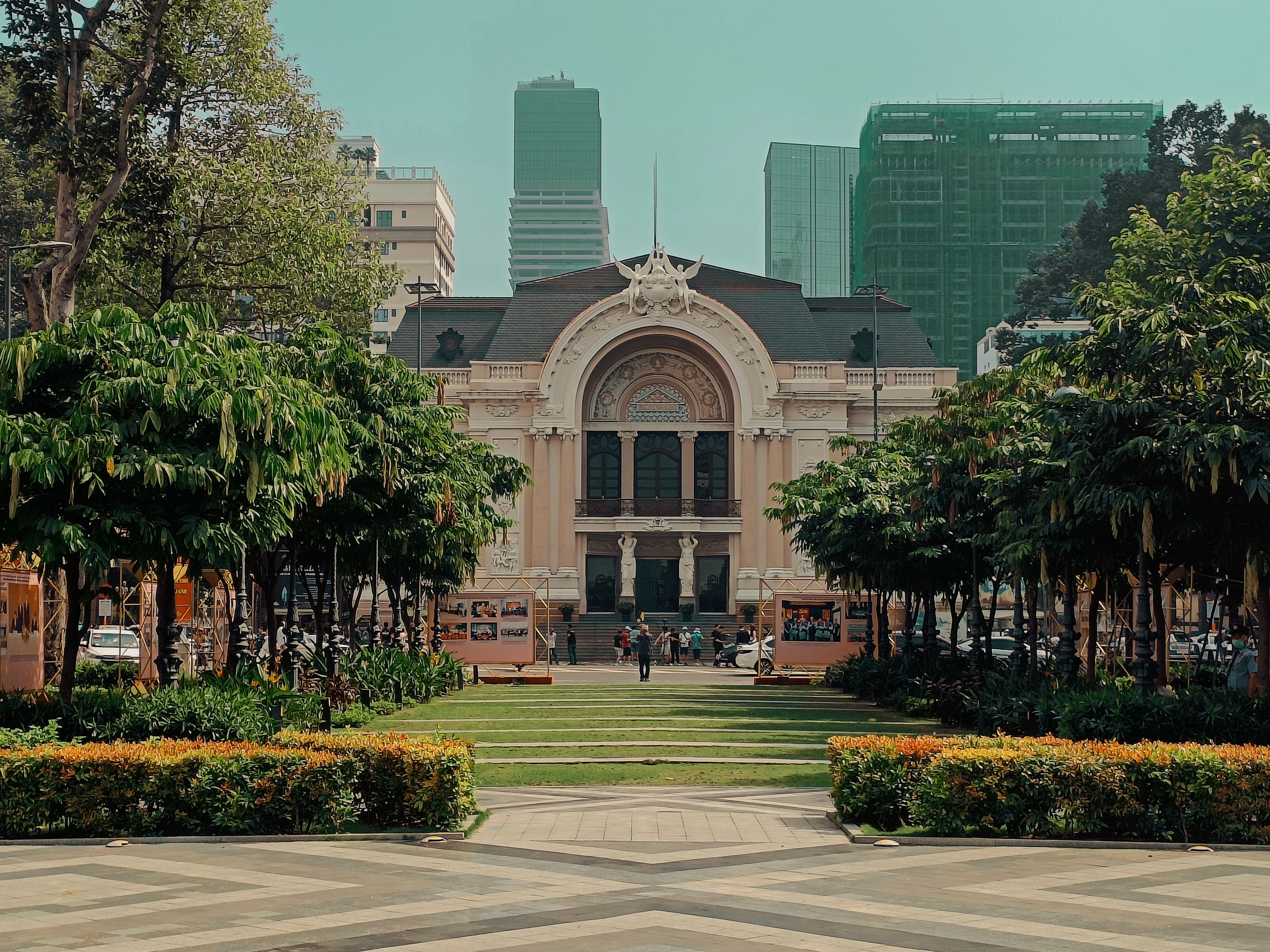 Elegant Architecture and Lush Greenery in Urban Setting · Free Stock Photo