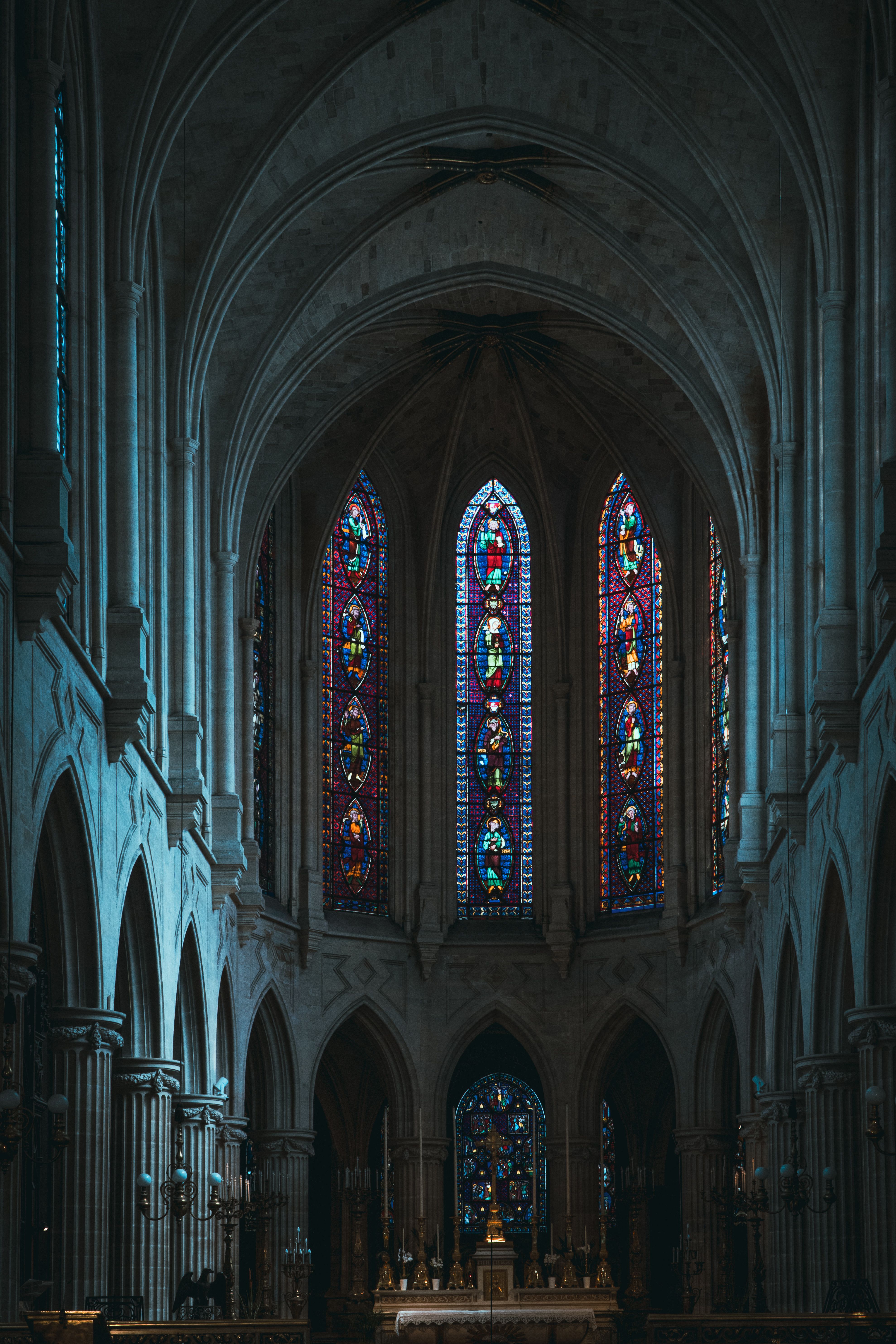Majestic Gothic Cathedral Interior with Stained Glass · Free Stock Photo