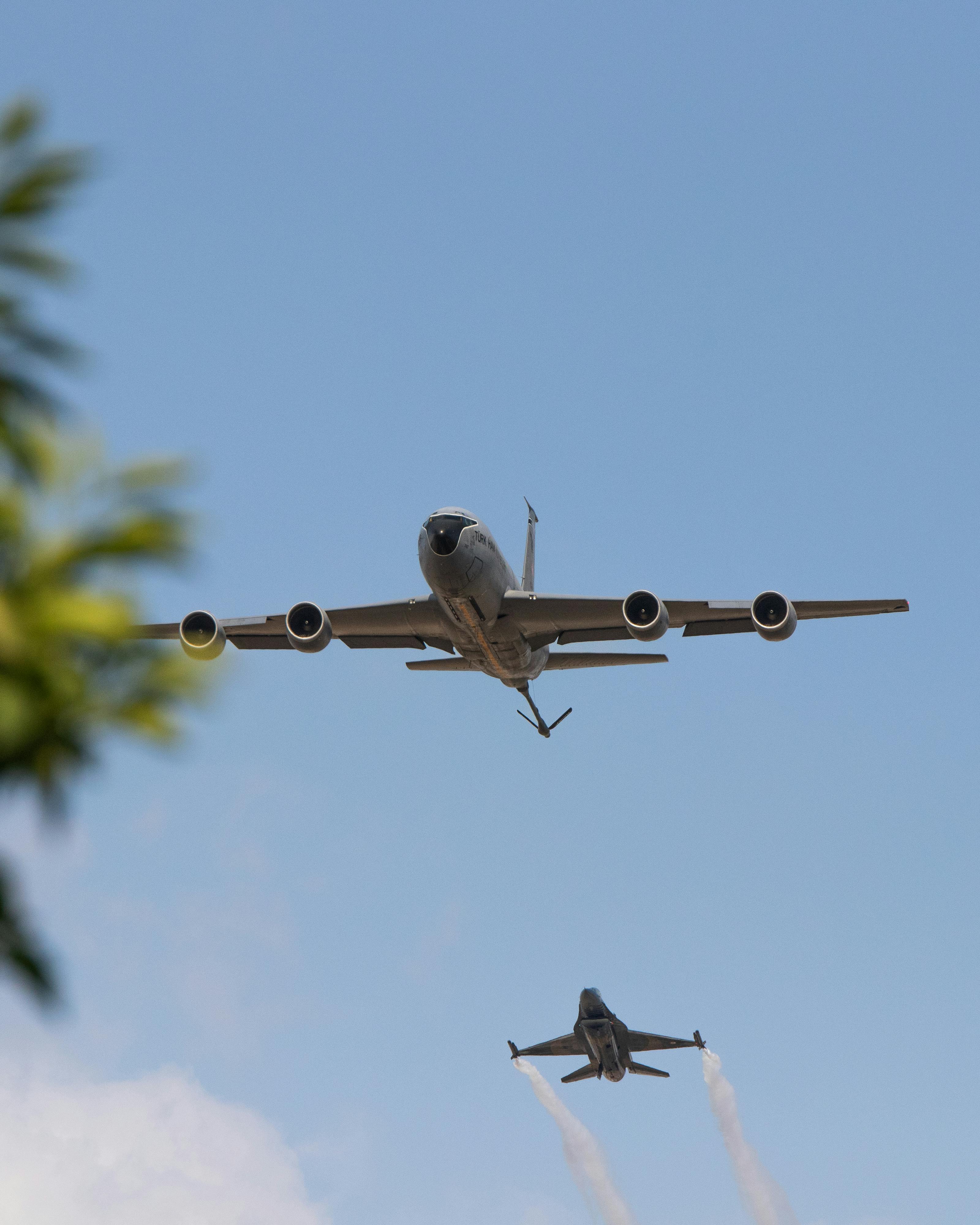 Military aircraft in flight formation over sky · Free Stock Photo