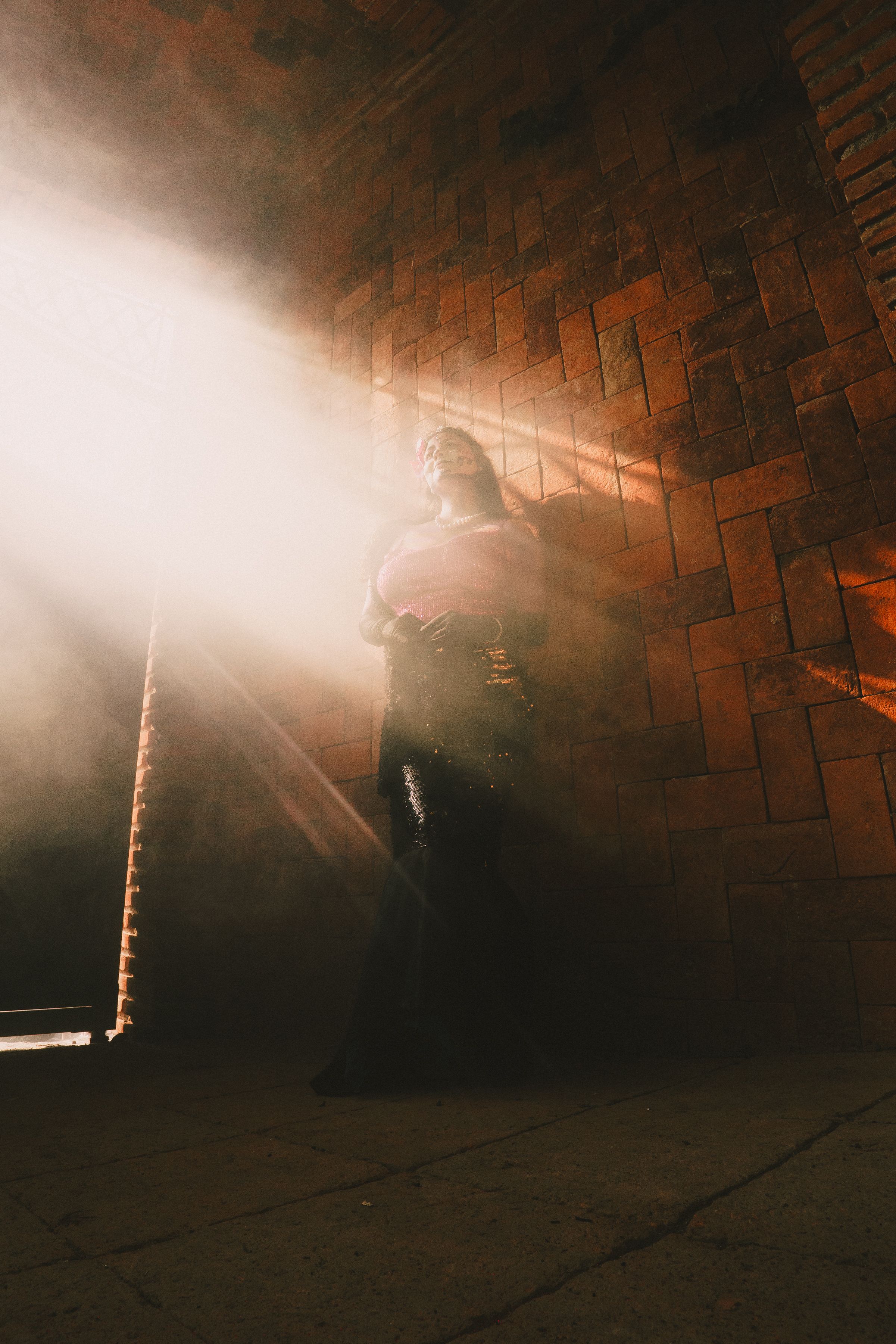 Dramatic Light Beam in Brick Archway · Free Stock Photo
