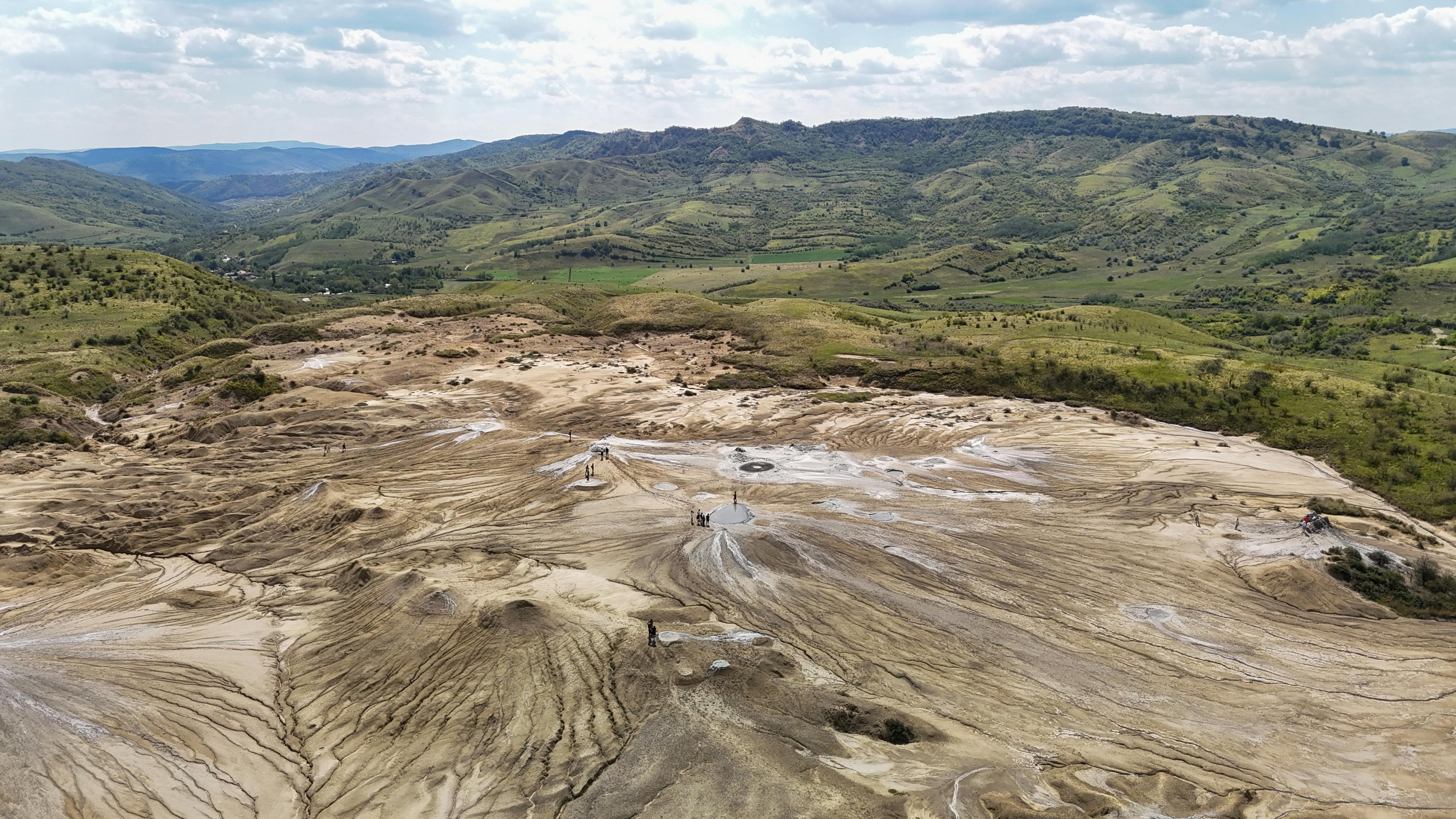 Aerial View of Scenic Mud Volcanoes Landscape · Free Stock Photo