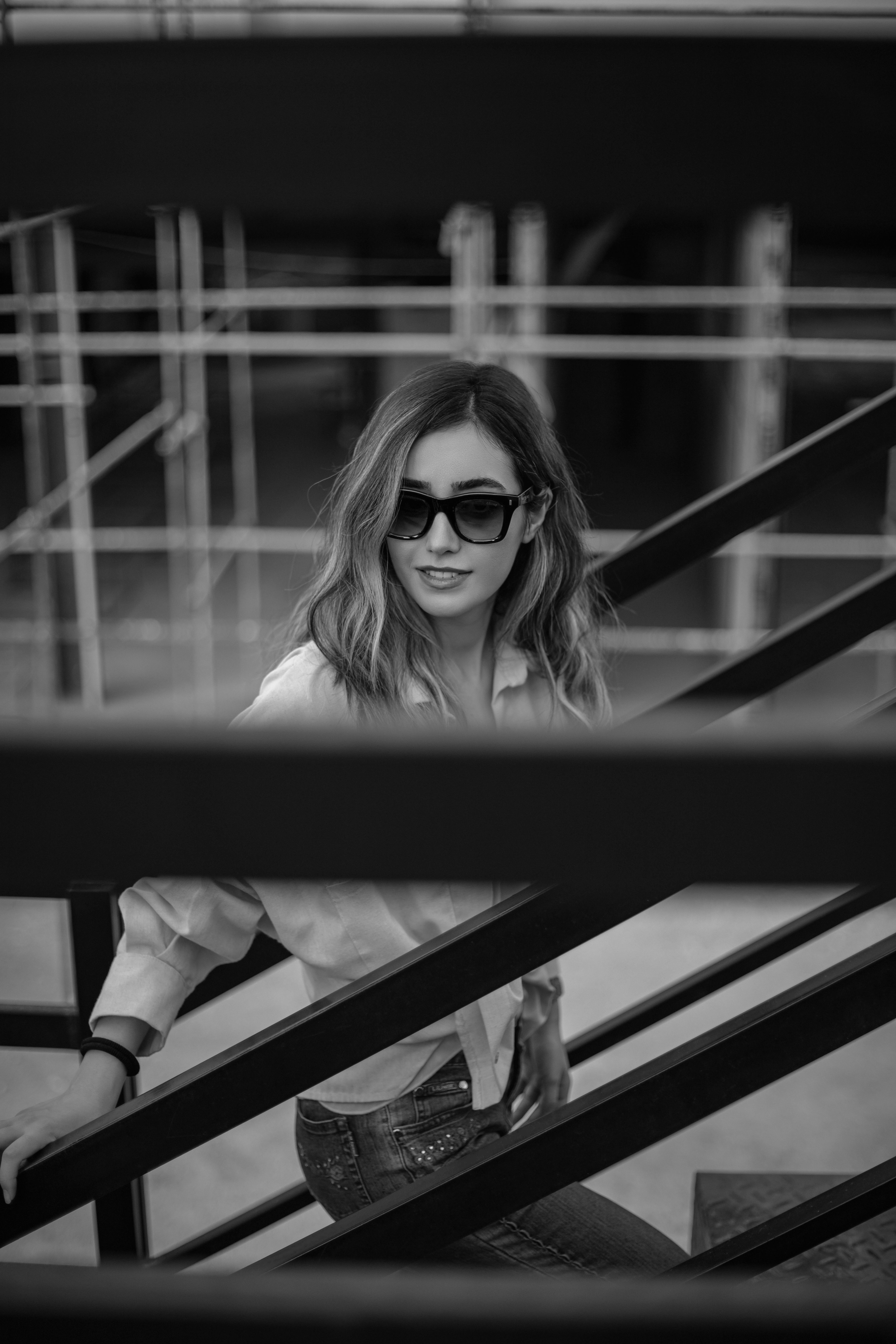 Stylish Woman on Stairs in Black and White Portrait · Free Stock Photo