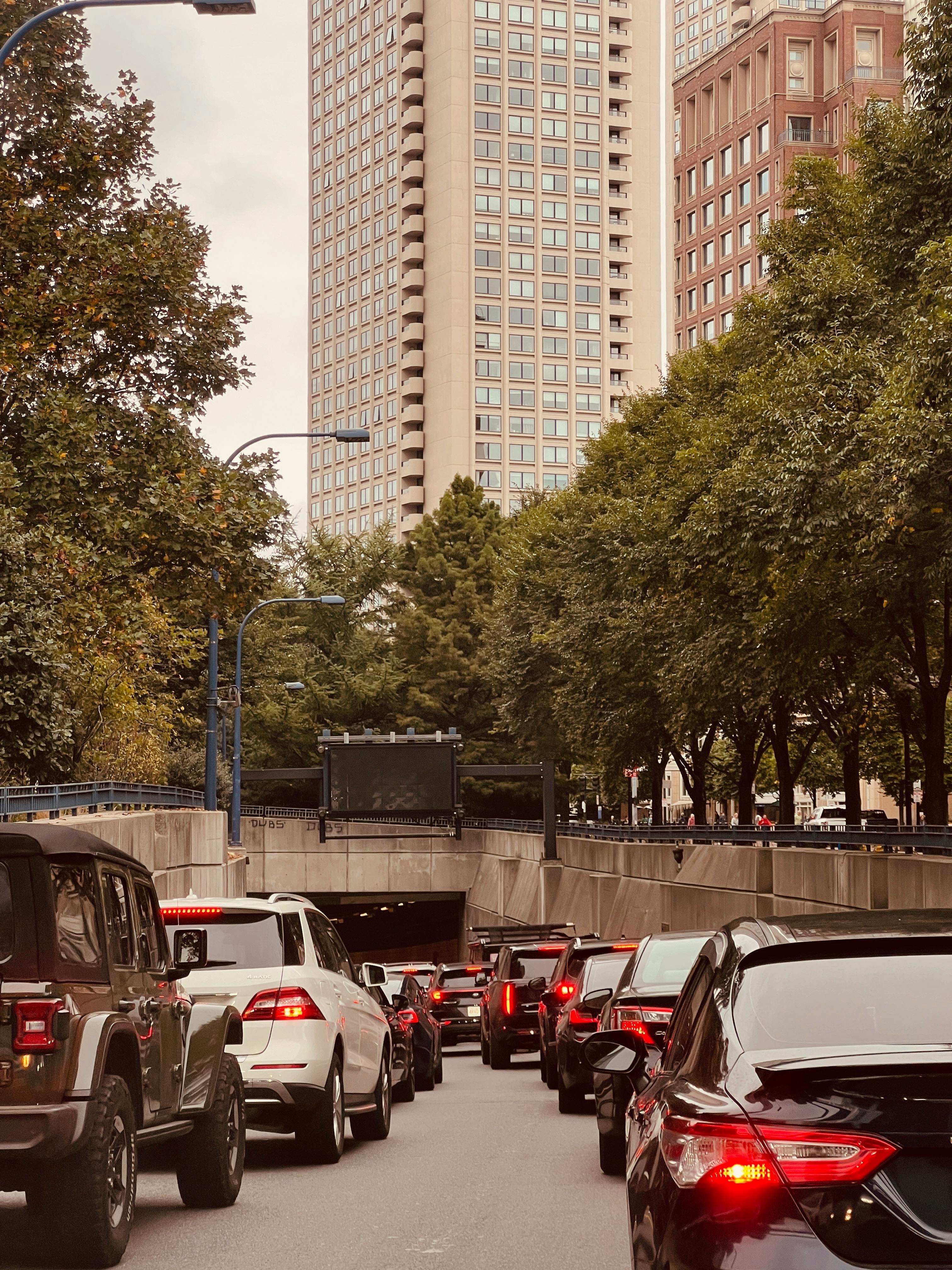 Urban Traffic Jam with High-Rise Background · Free Stock Photo