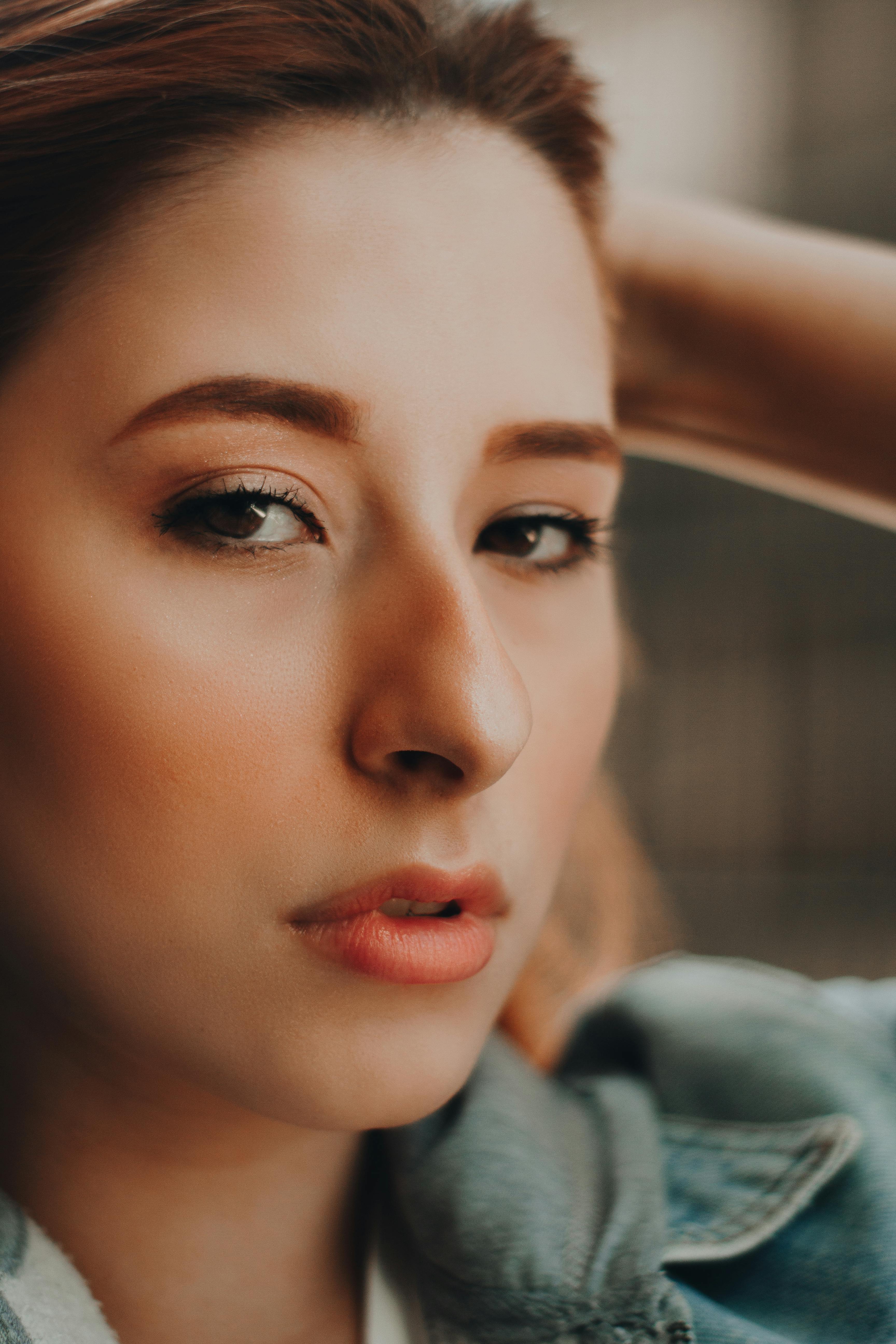 A Pretty Woman Looking over Her Shoulder · Free Stock Photo