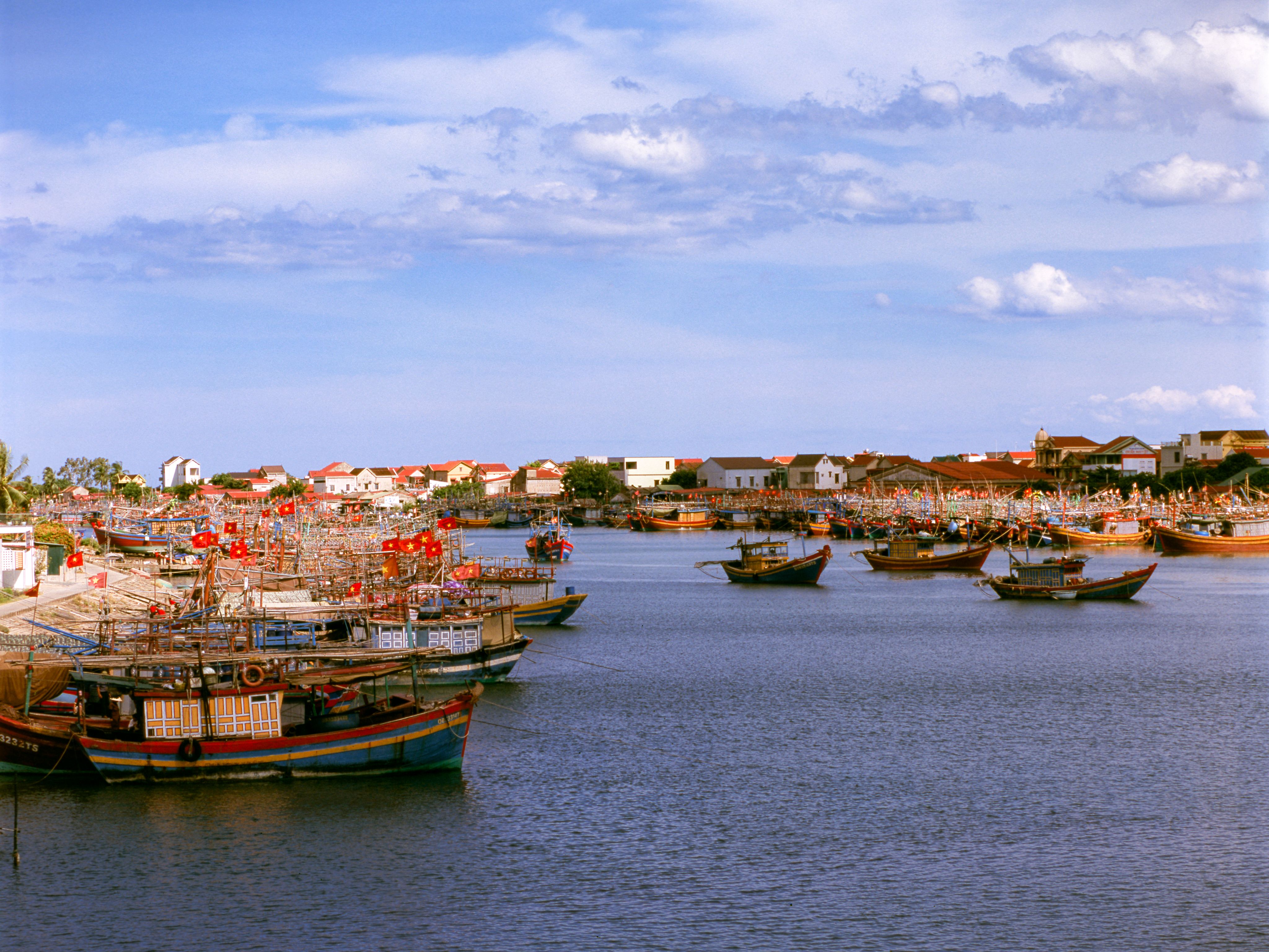 Colorful Fishing Boats in a Vietnamese Harbor · Free Stock Photo