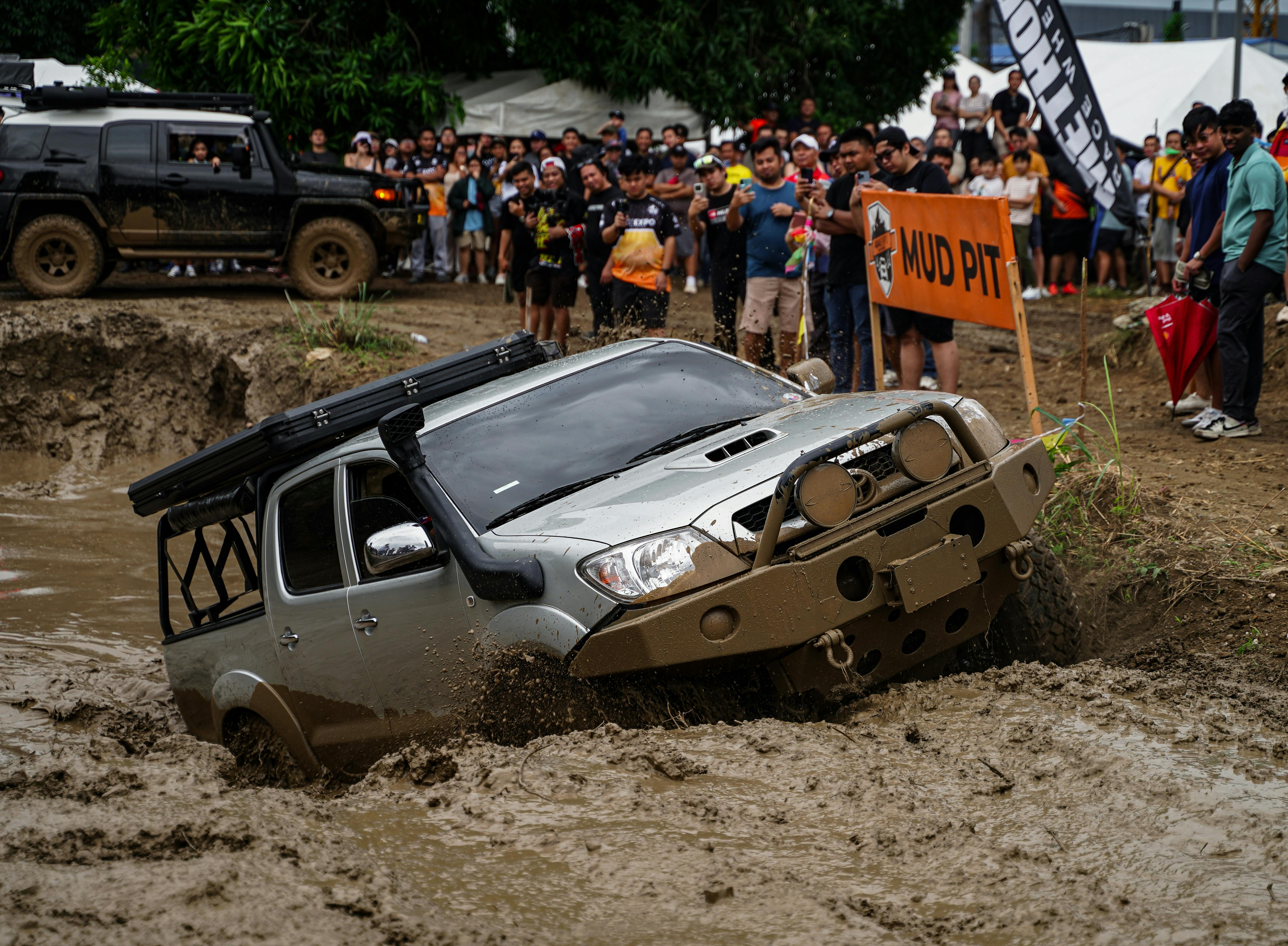 4x4 Vehicle in Mud Pit Challenge Event · Free Stock Photo