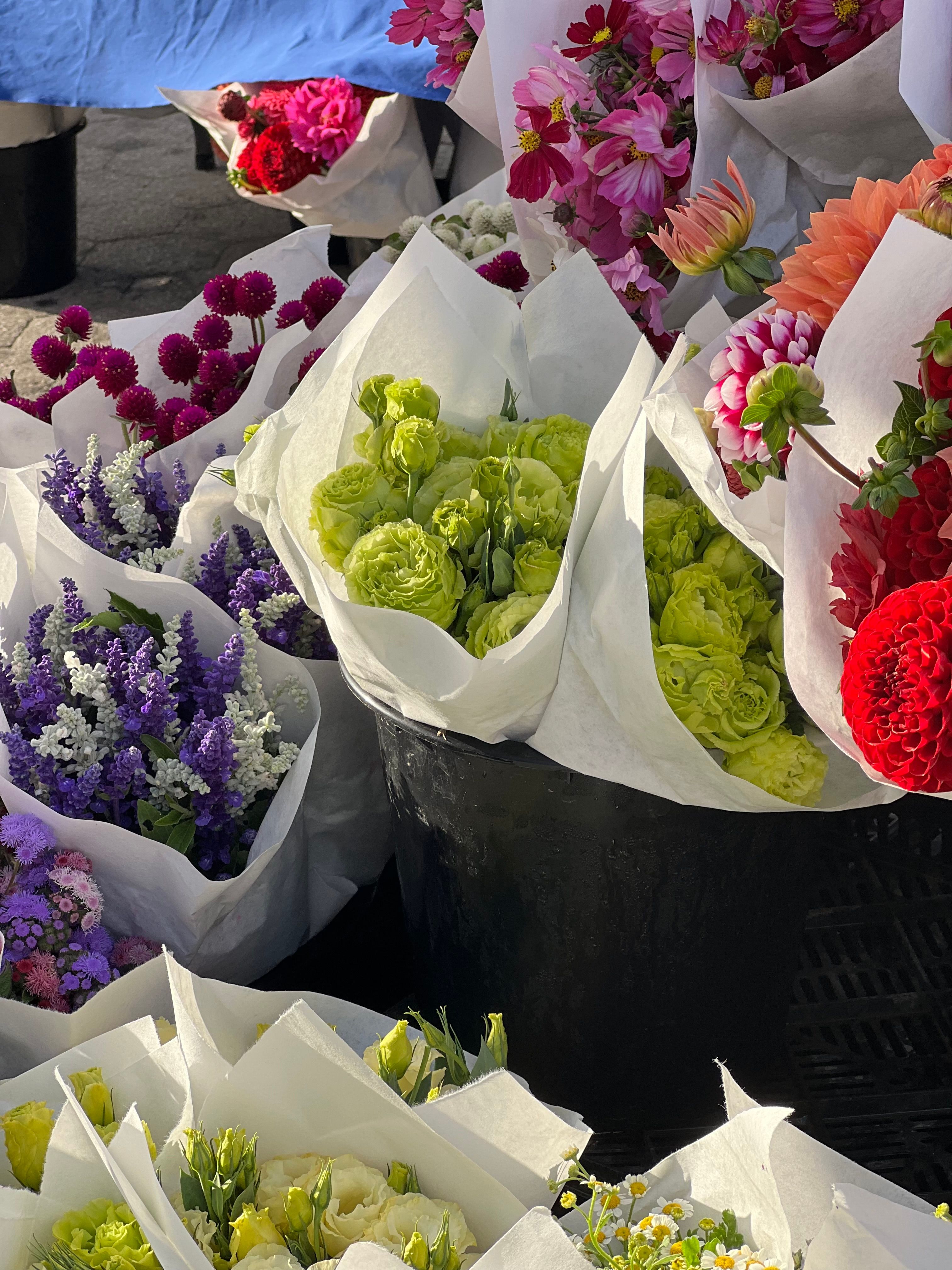 Colorful Flower Bouquets in a Market Stall · Free Stock Photo