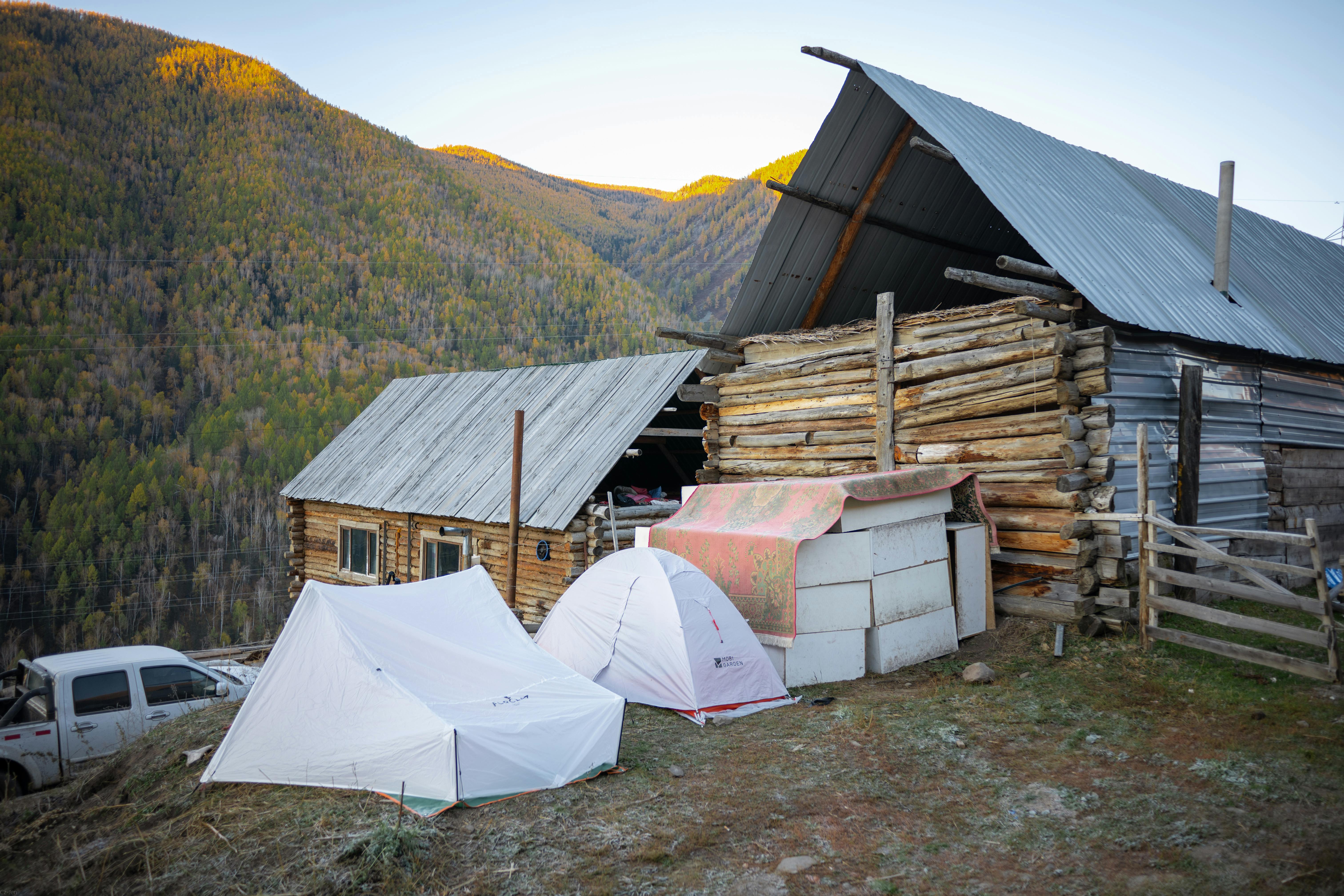 Rustic Campsite Near Mountain Cabin · Free Stock Photo
