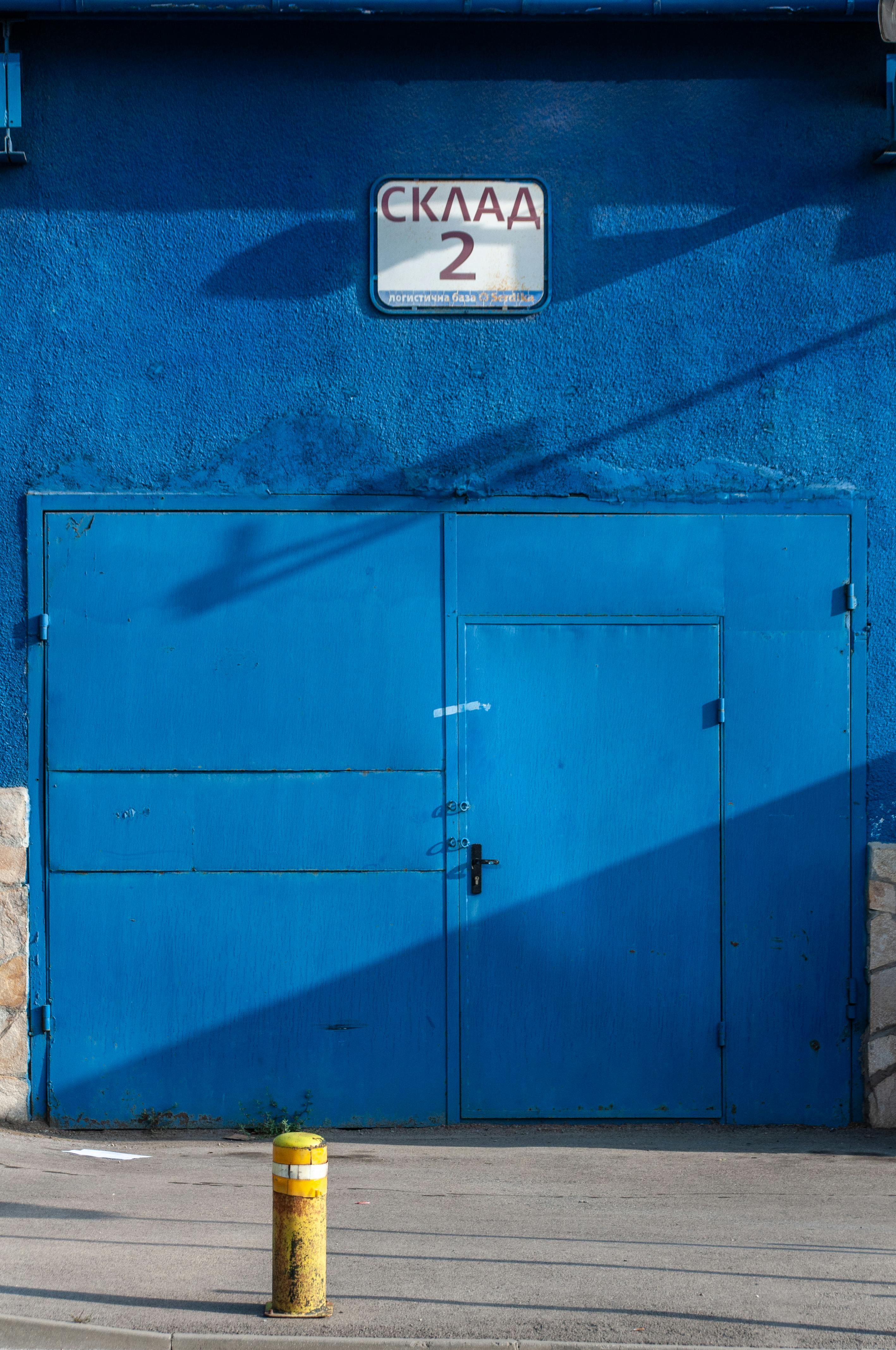 Photo of Blue Shutter Door · Free Stock Photo