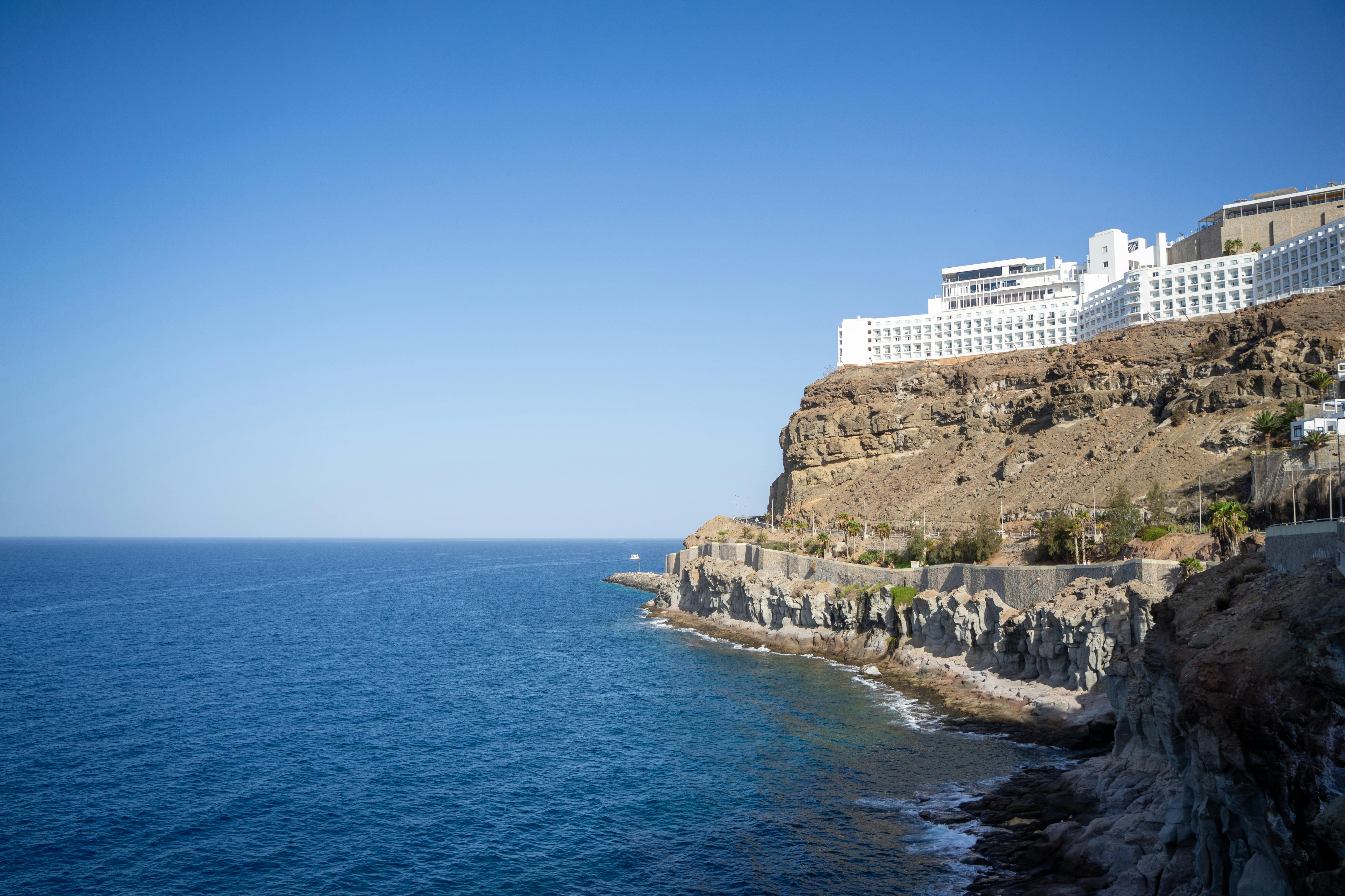 Coastal Cliffs and Hotel in Puerto Rico, Spain · Free Stock Photo