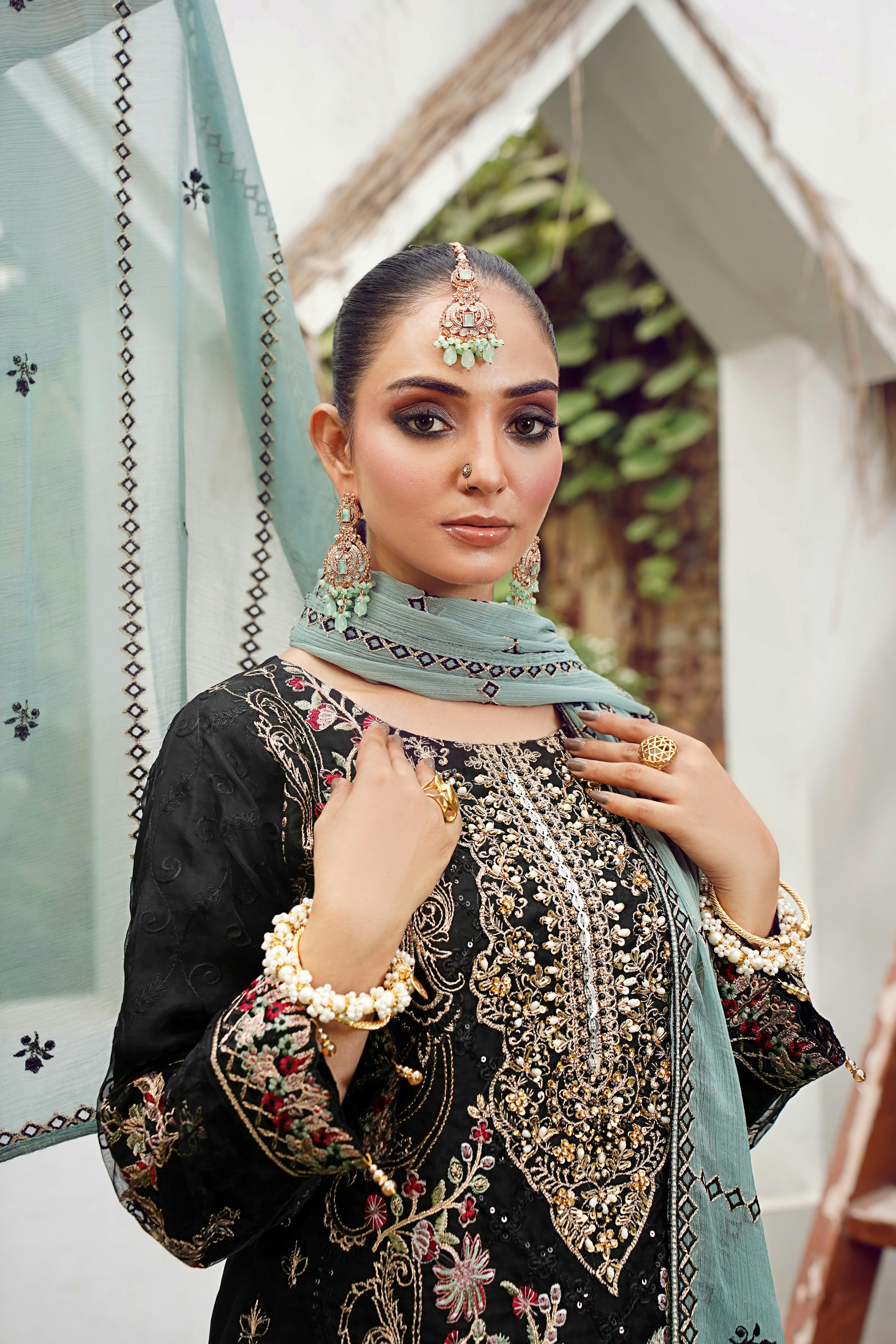 Elegant Eastern Fashion Model in Traditional Dress · Free Stock Photo