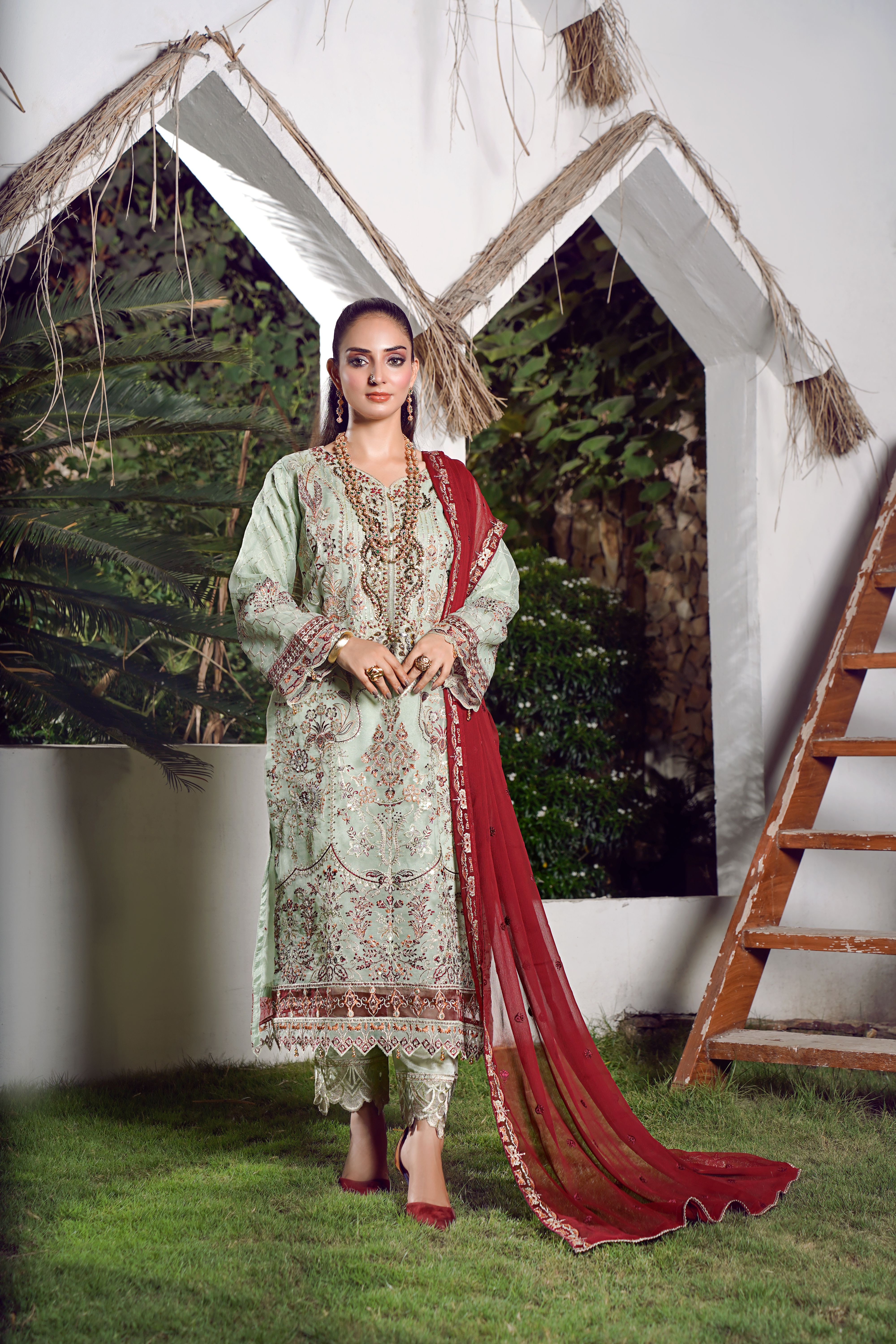 Elegant Eastern Fashion in Lahore Garden Setting · Free Stock Photo